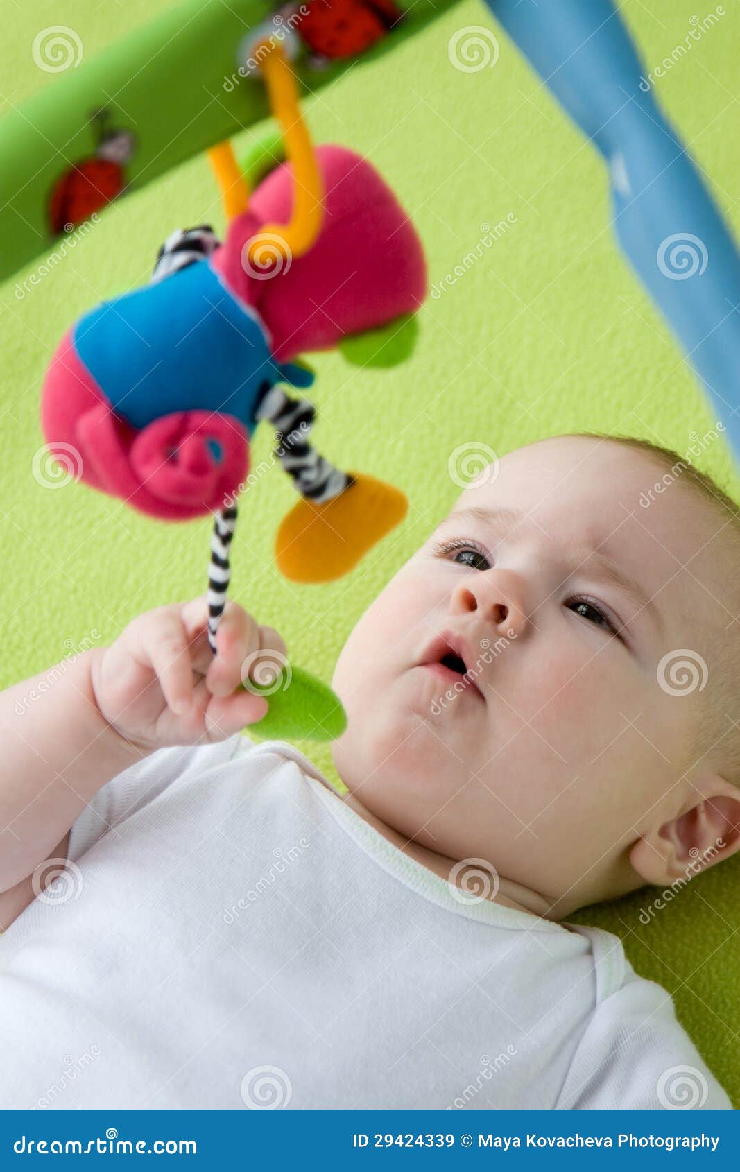 Baby Looking Up at a Mobile Toy Stock Image - Image of excited ...