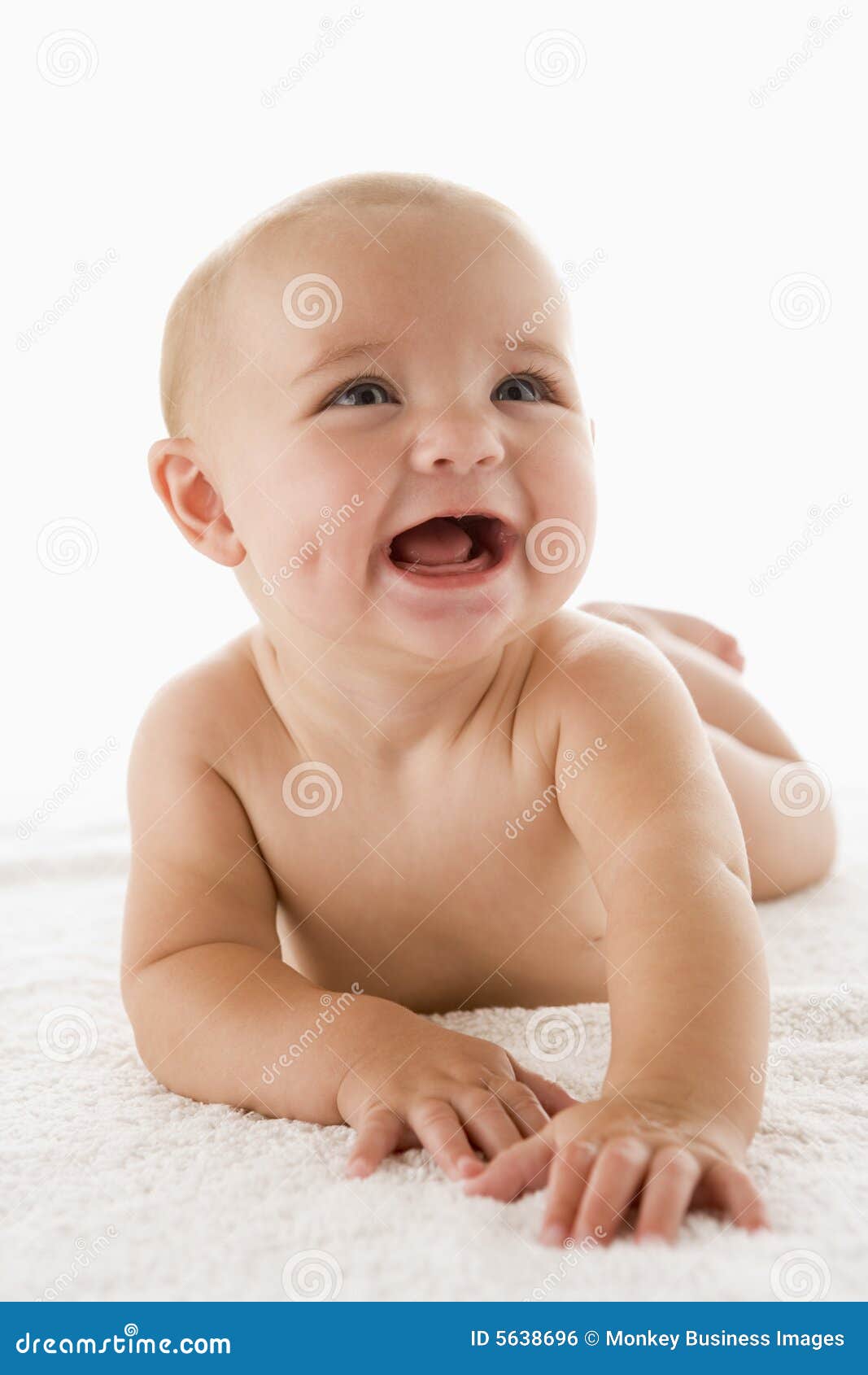 Baby lying down smiling stock photo. Image of female, laying - 5638696