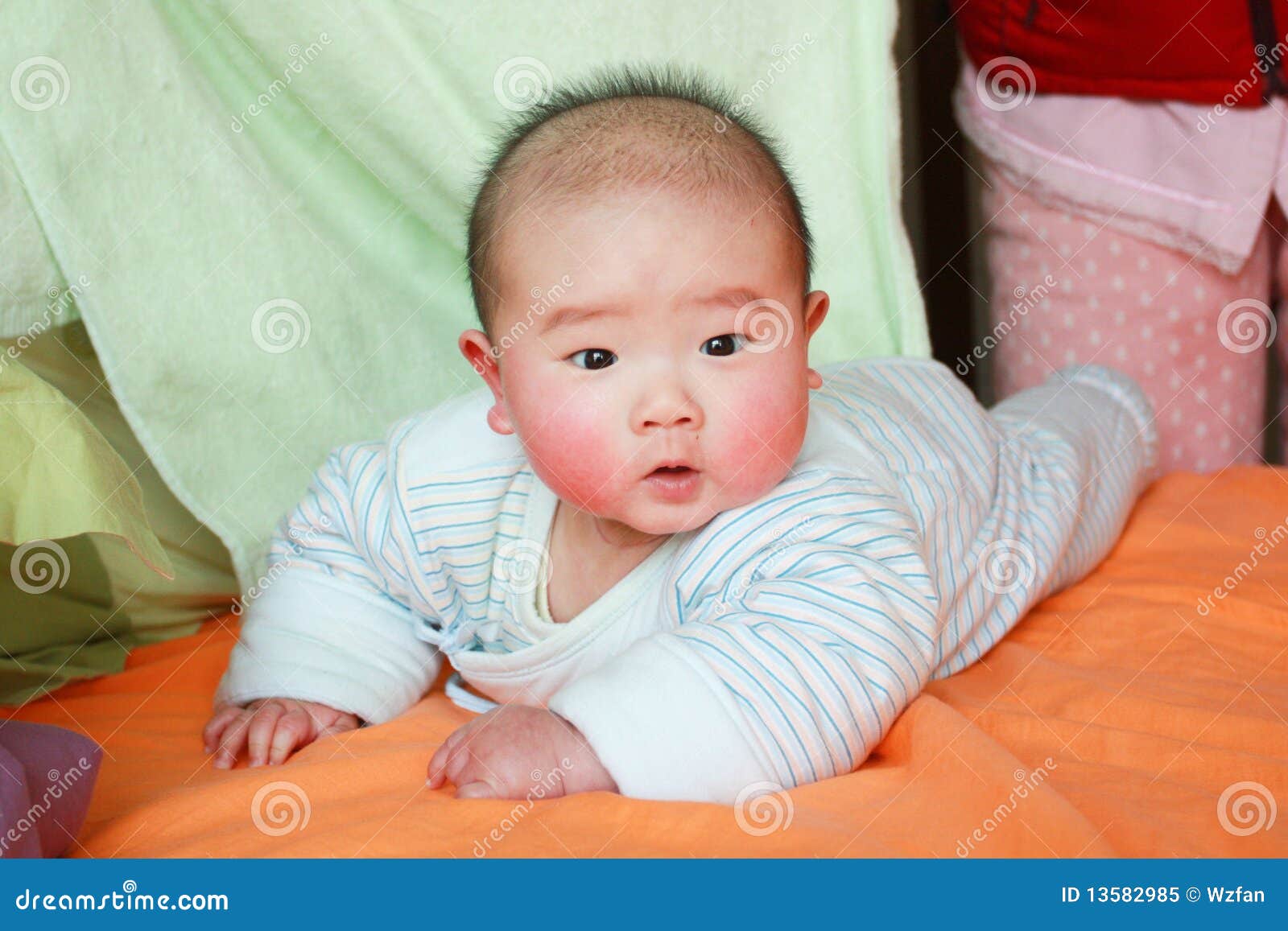 Baby lying prone stock image. Image of chinese, yellow - 13582985