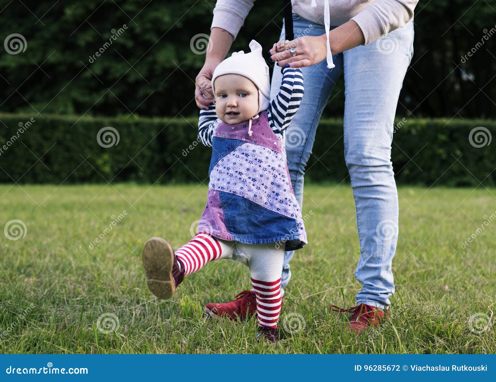 A Baby is Making the First Steps Stock Photo - Image of support, little ...