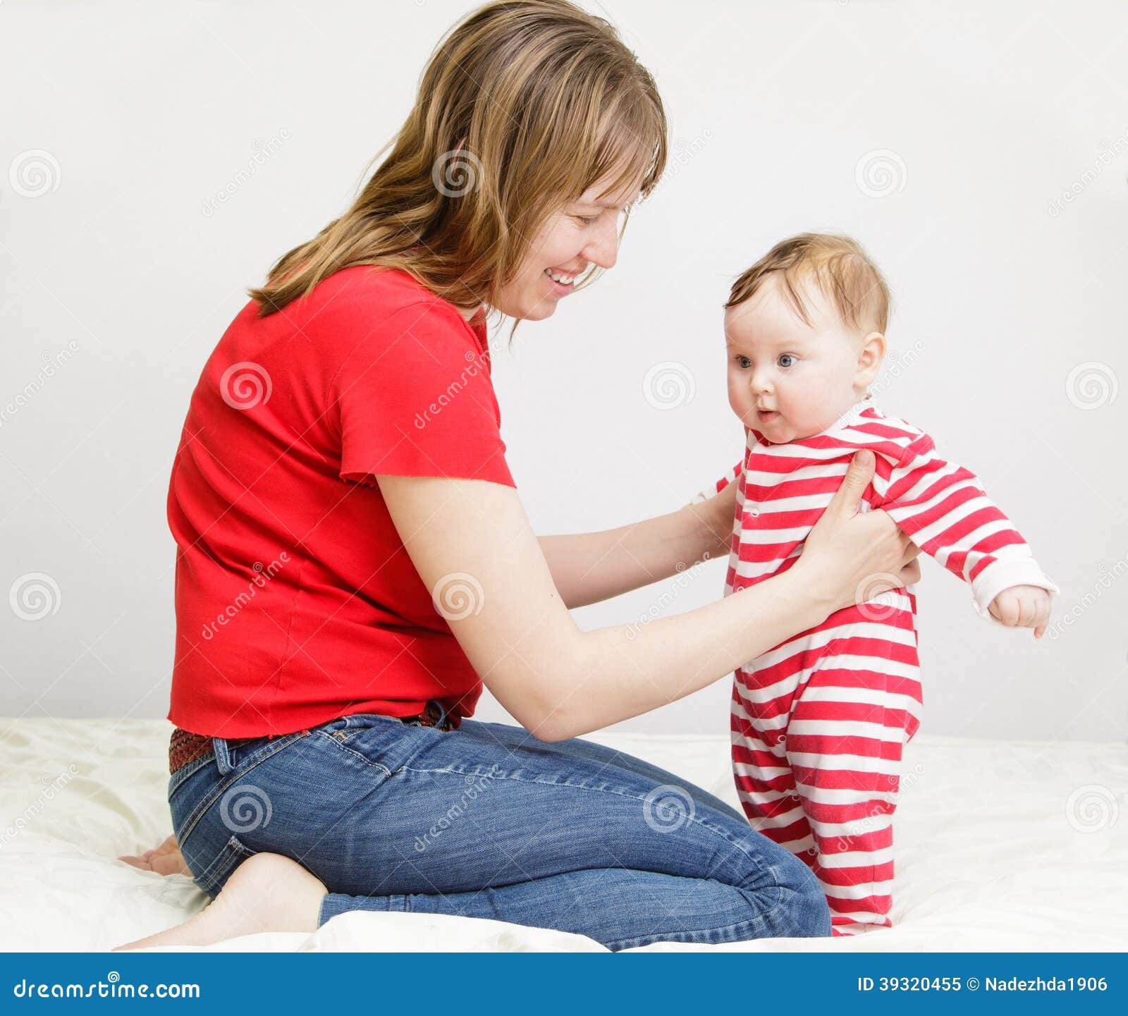 Baby making first steps stock image. Image of child, mommy - 39320455