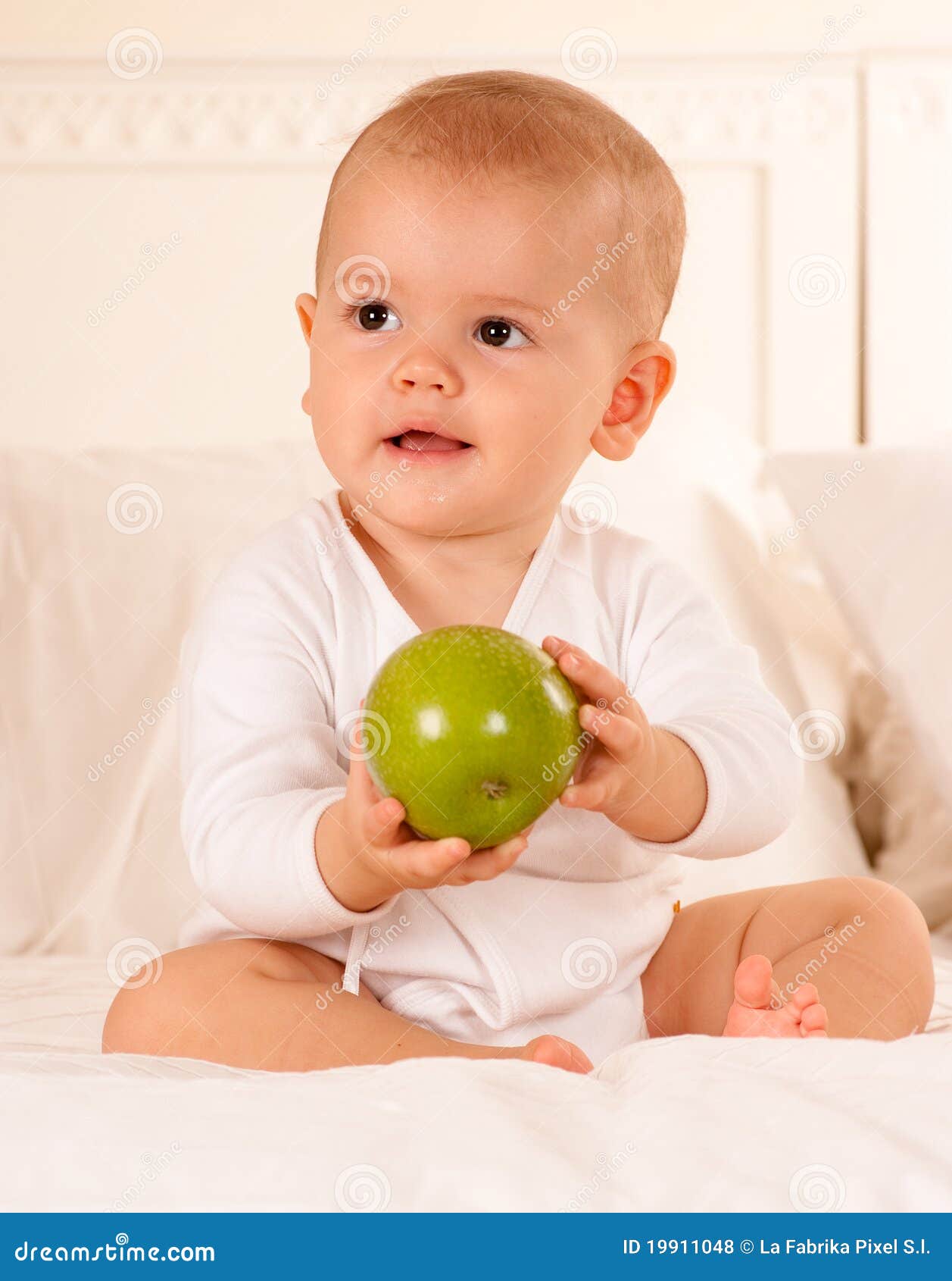 Baby Manipulating Green Apple Stock Photo - Image of caucasian ...