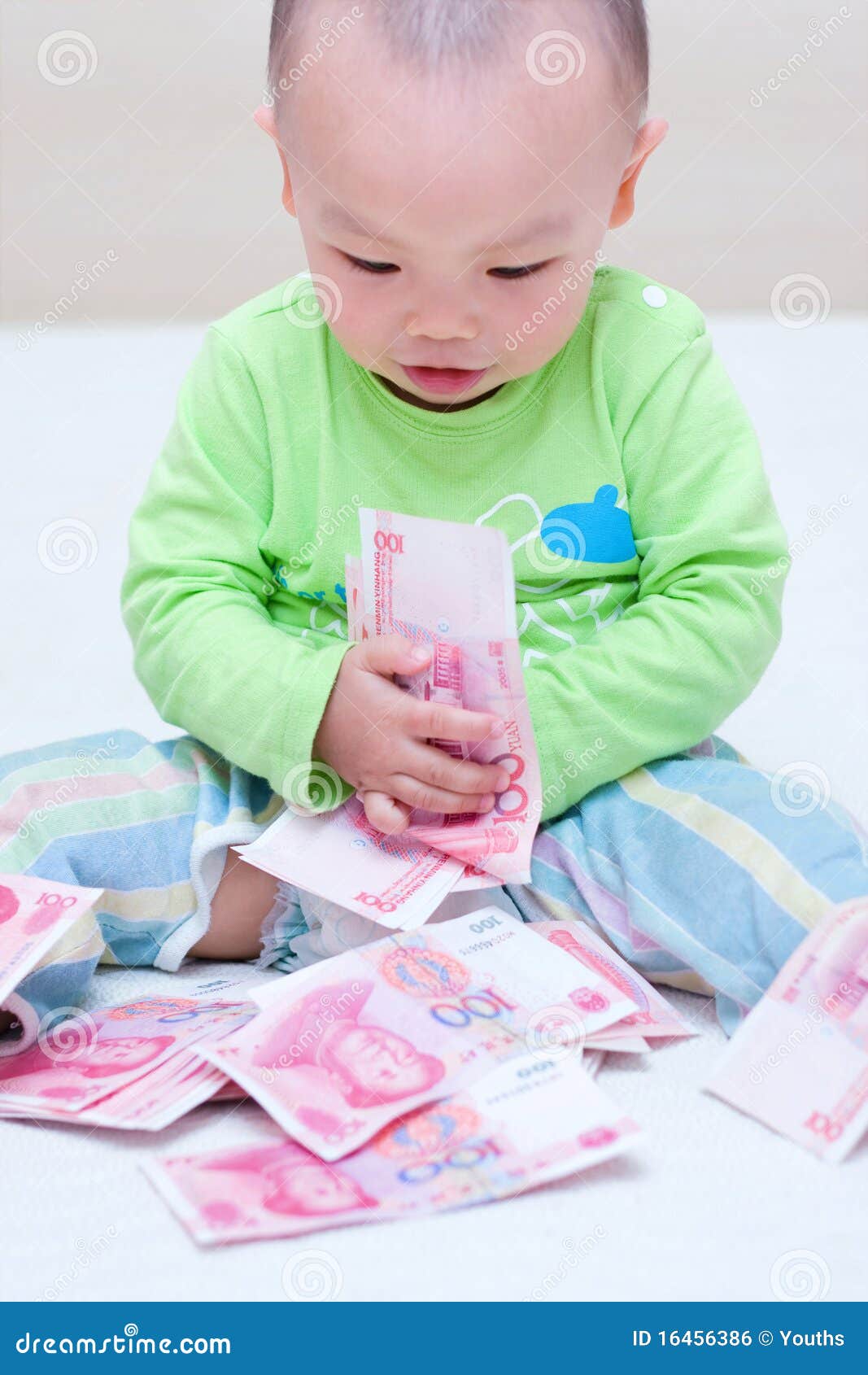 Baby with money in hand stock photo. Image of little - 16456386
