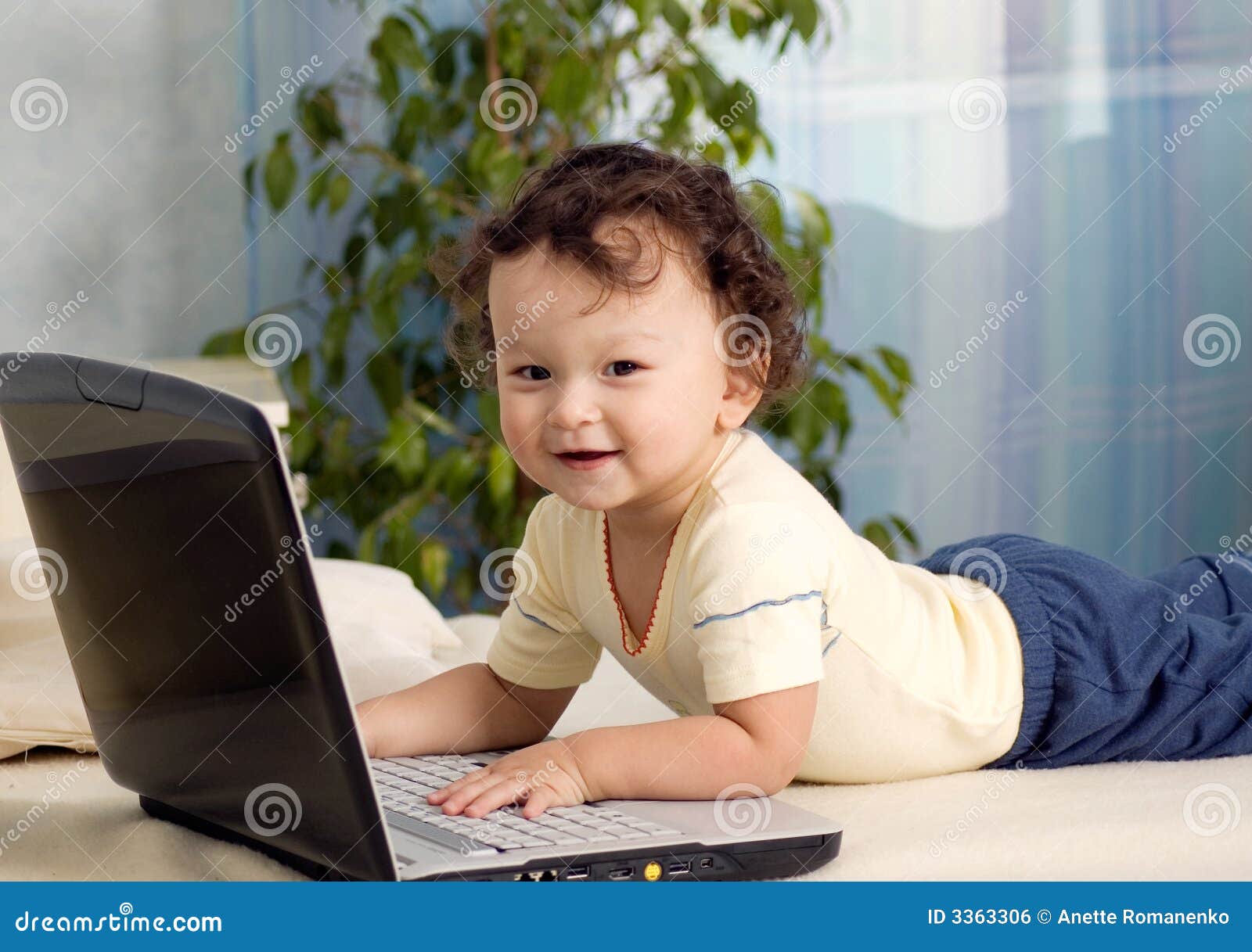 Baby with notebook. stock photo. Image of media, baby - 3363306