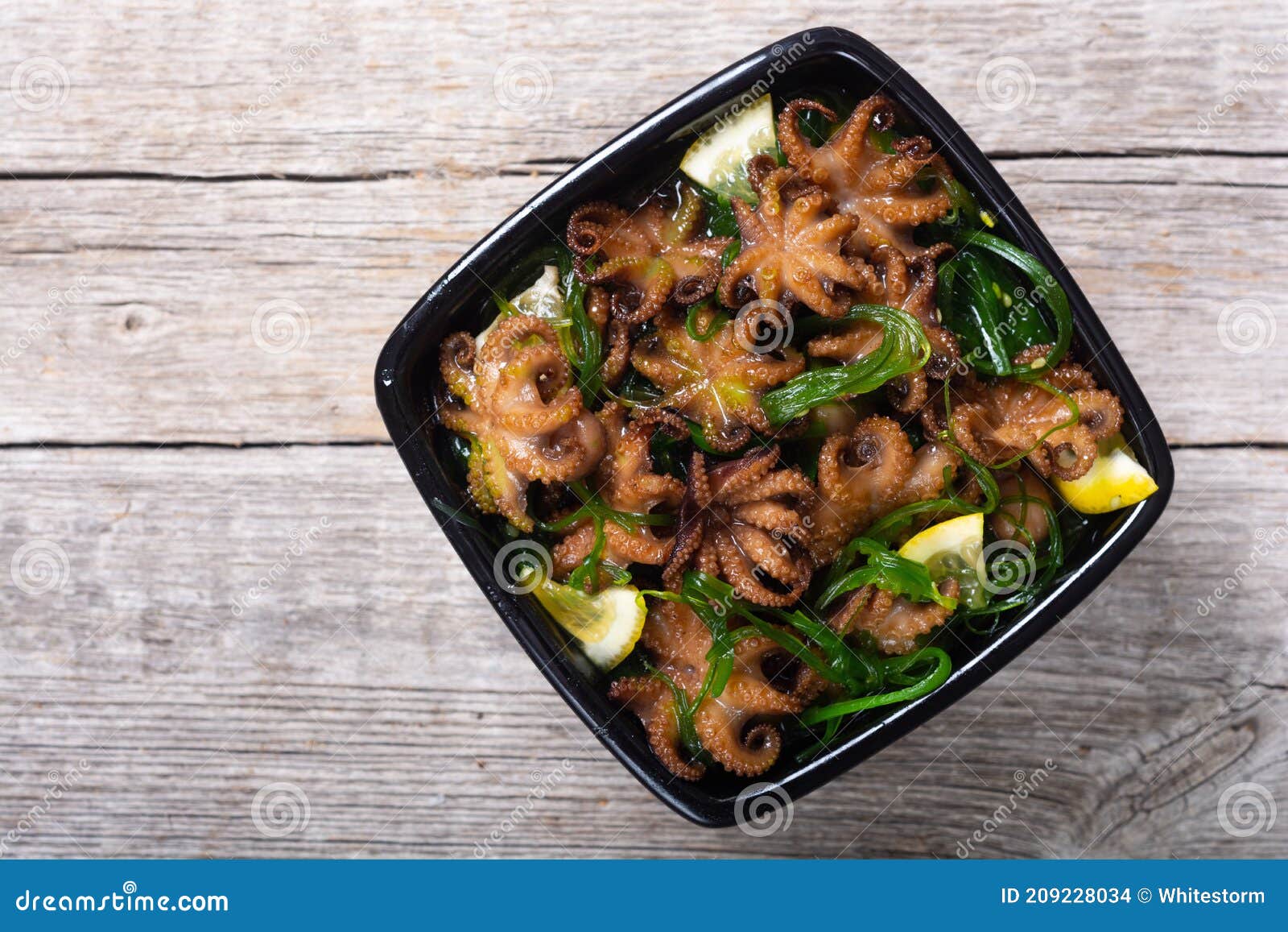 Baby Octopus Fried with Lemon Stock Photo - Image of meat, gourmet ...