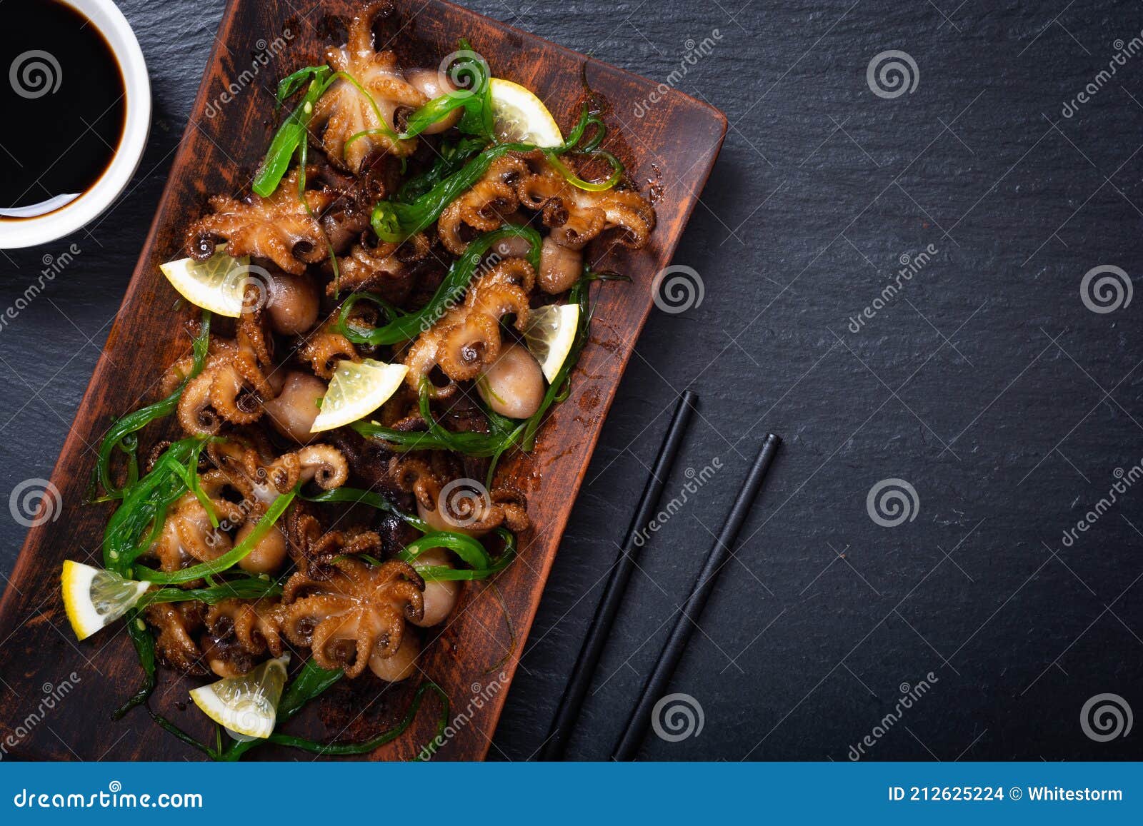 Baby Octopus Fried with Lemon Stock Photo - Image of olive, dish: 212625224