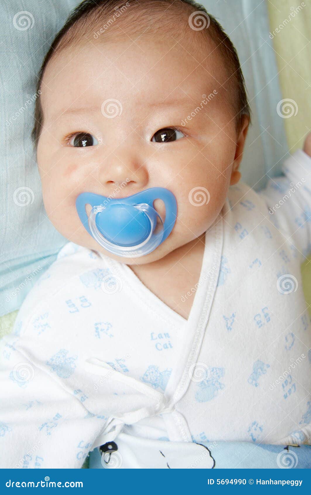 Baby with pacifier stock photo. Image of expression, care - 5694990