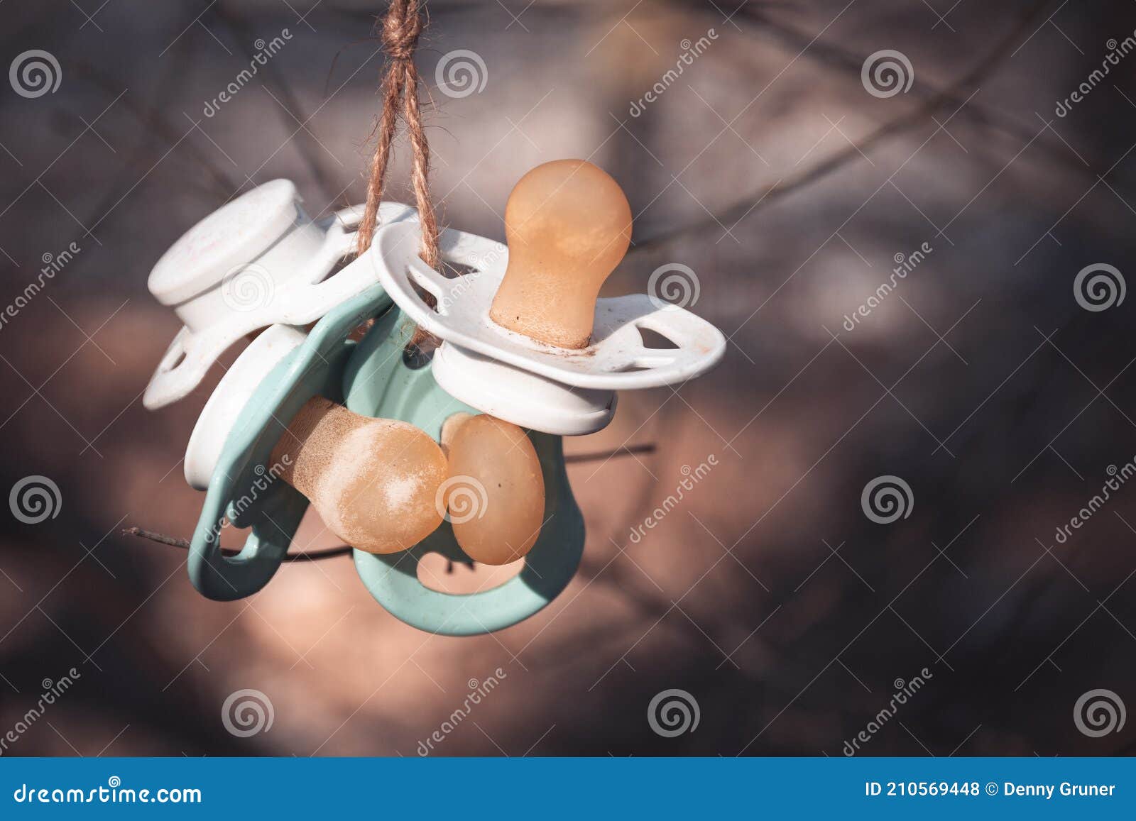 Baby pacifier on a cord stock photo. Image of conception - 210569448