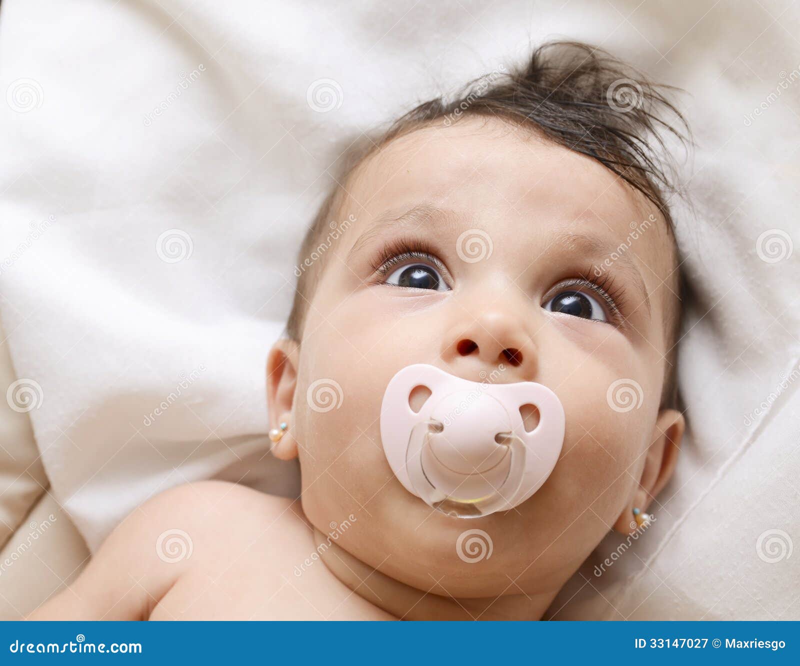 Baby with pacifier stock image. Image of lying, brunette - 33147027