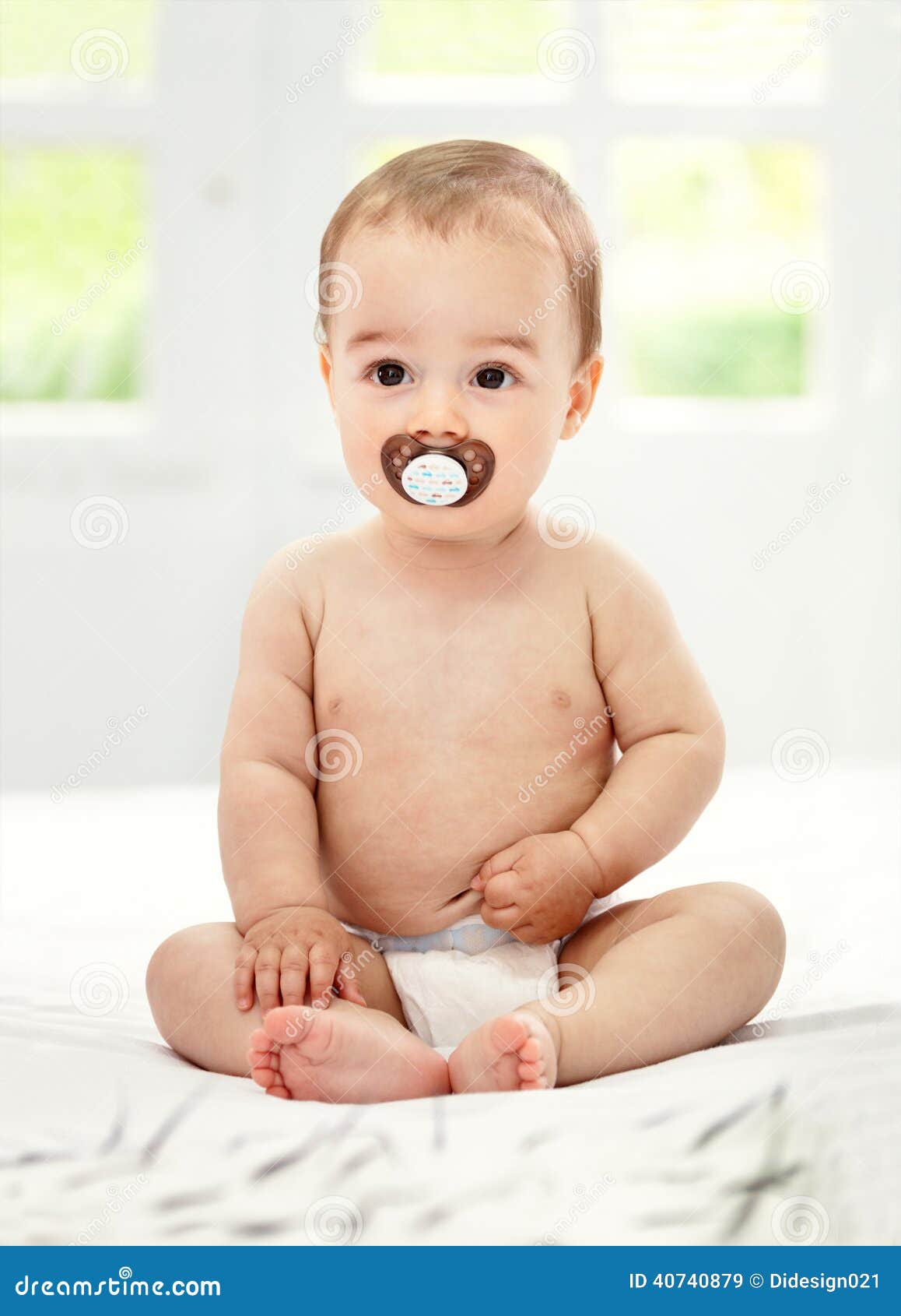 Baby with pacifier stock image. Image of laughing, adorable - 40740879