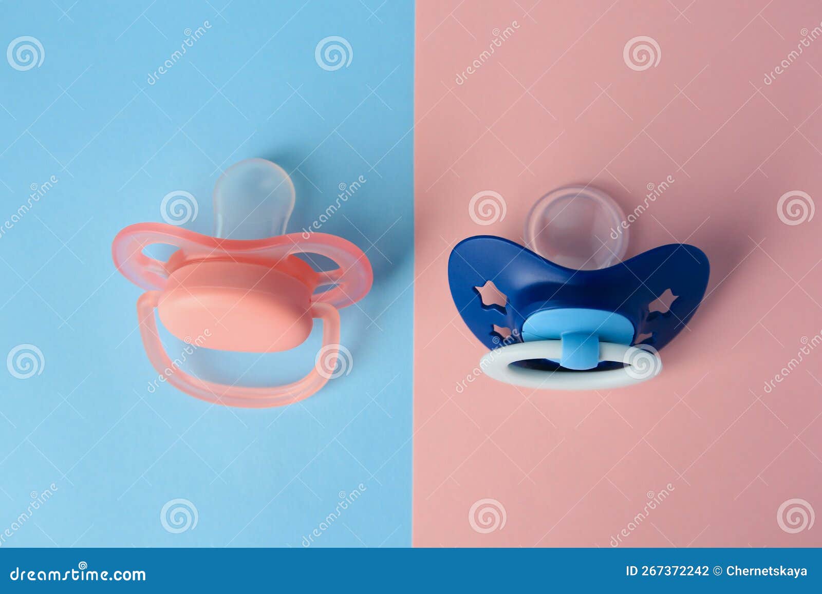 Baby Pacifiers on Color Background, Above View Stock Photo - Image of ...