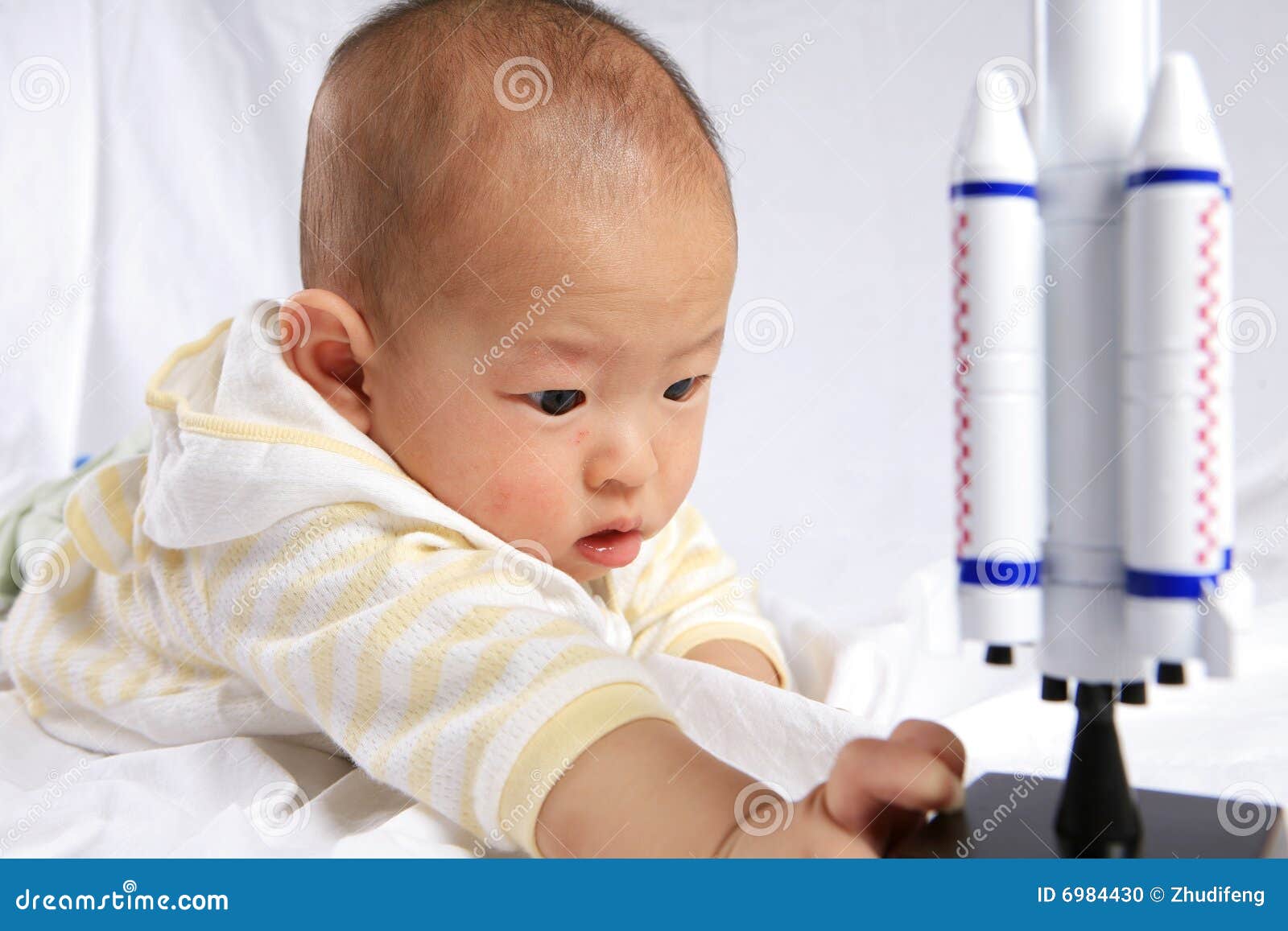 Baby Play with Rocket Model Stock Photo - Image of funny, play: 6984430