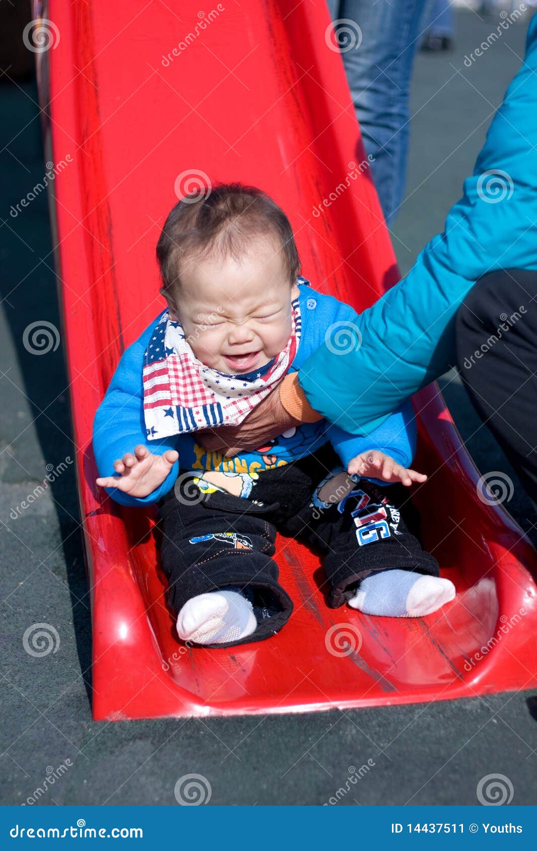 Baby play on slide stock image. Image of bonding, hair - 14437511