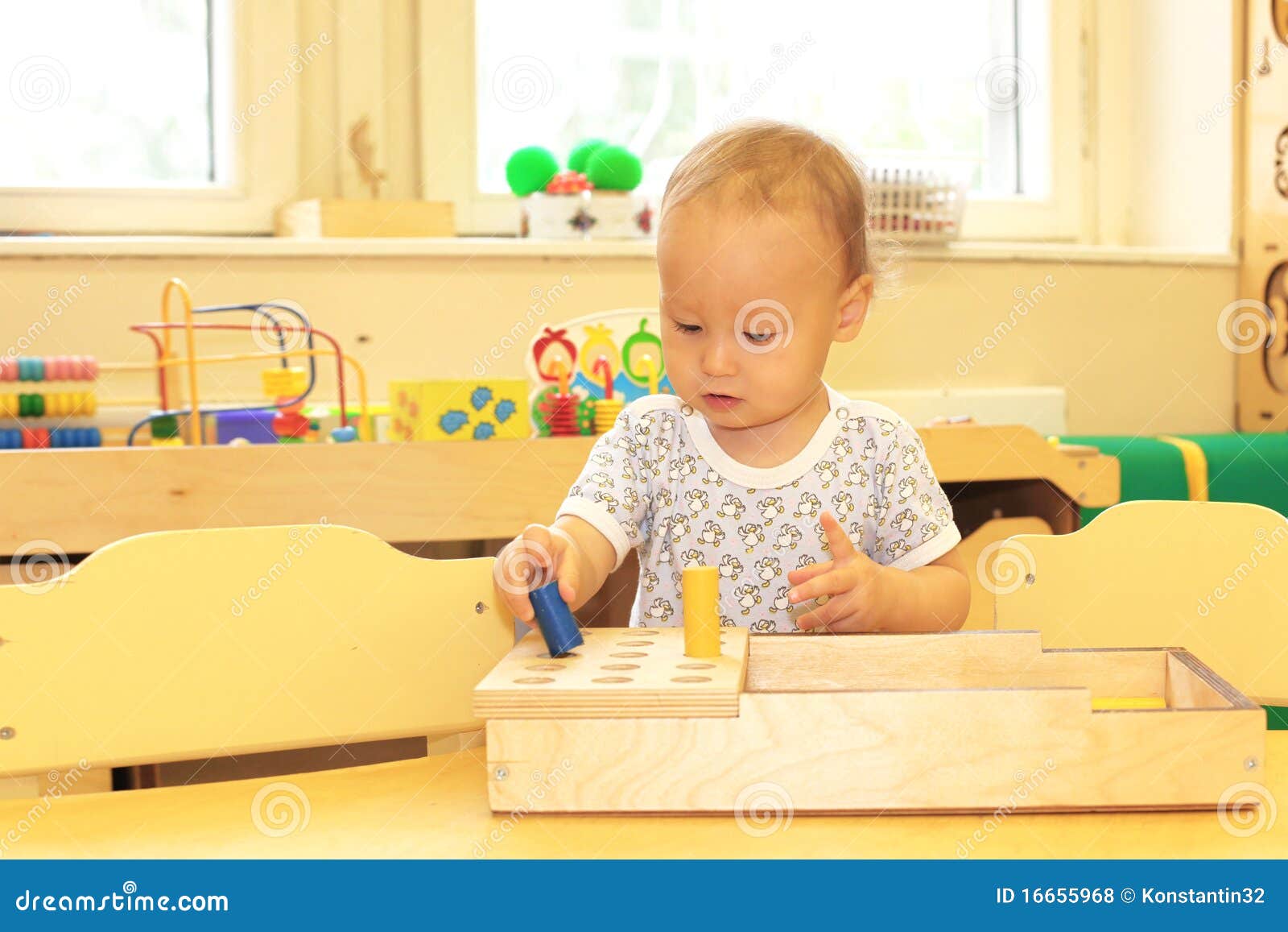 Baby playing with blocks stock photo. Image of building - 16655968