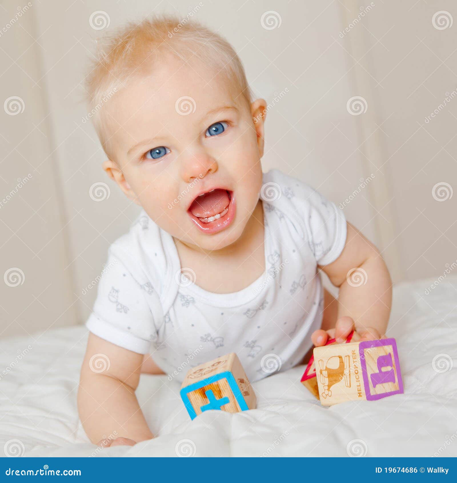 Baby playing with blocks stock photo. Image of facial - 19674686