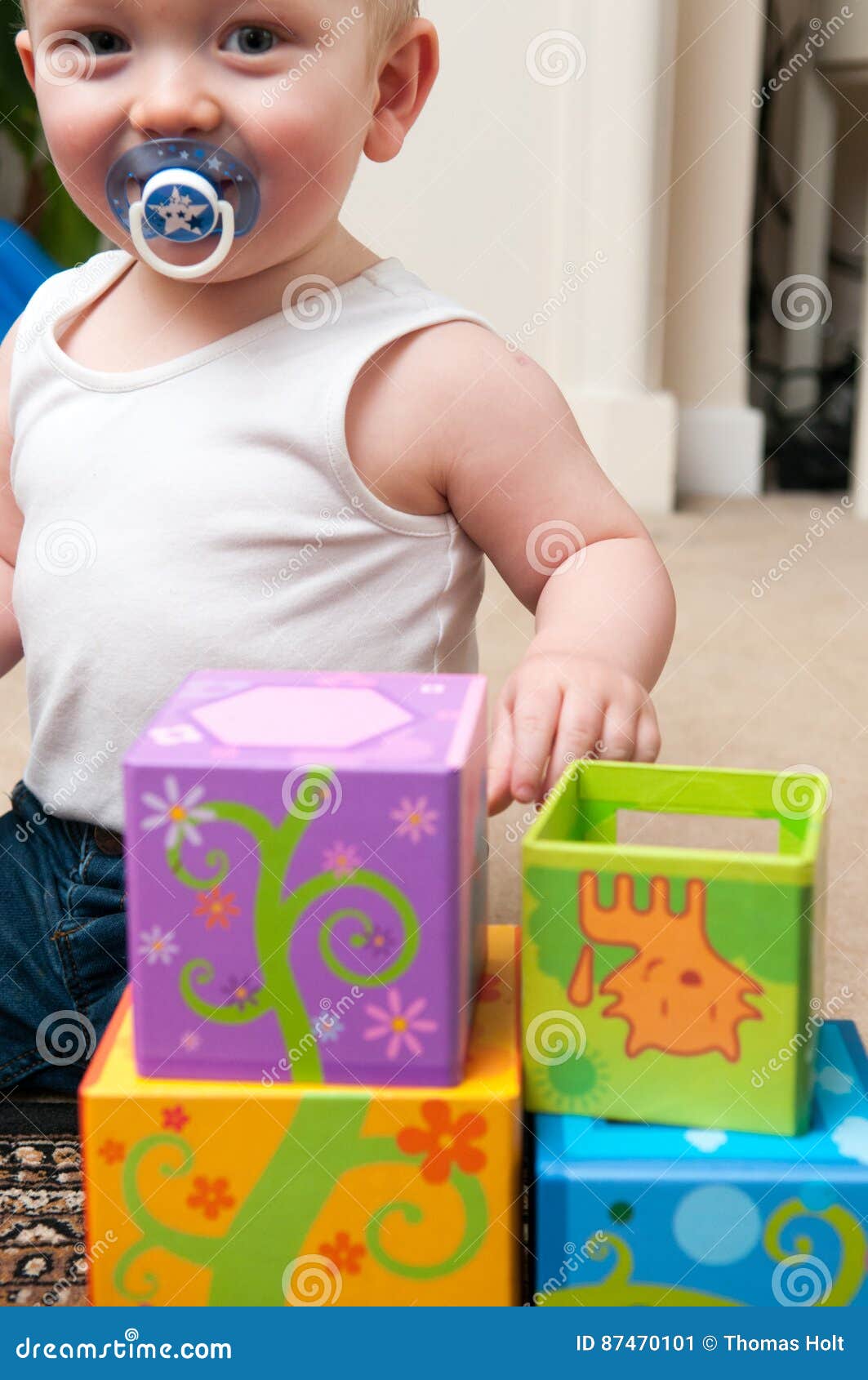 Baby playing with blocks stock image. Image of educate - 87470101