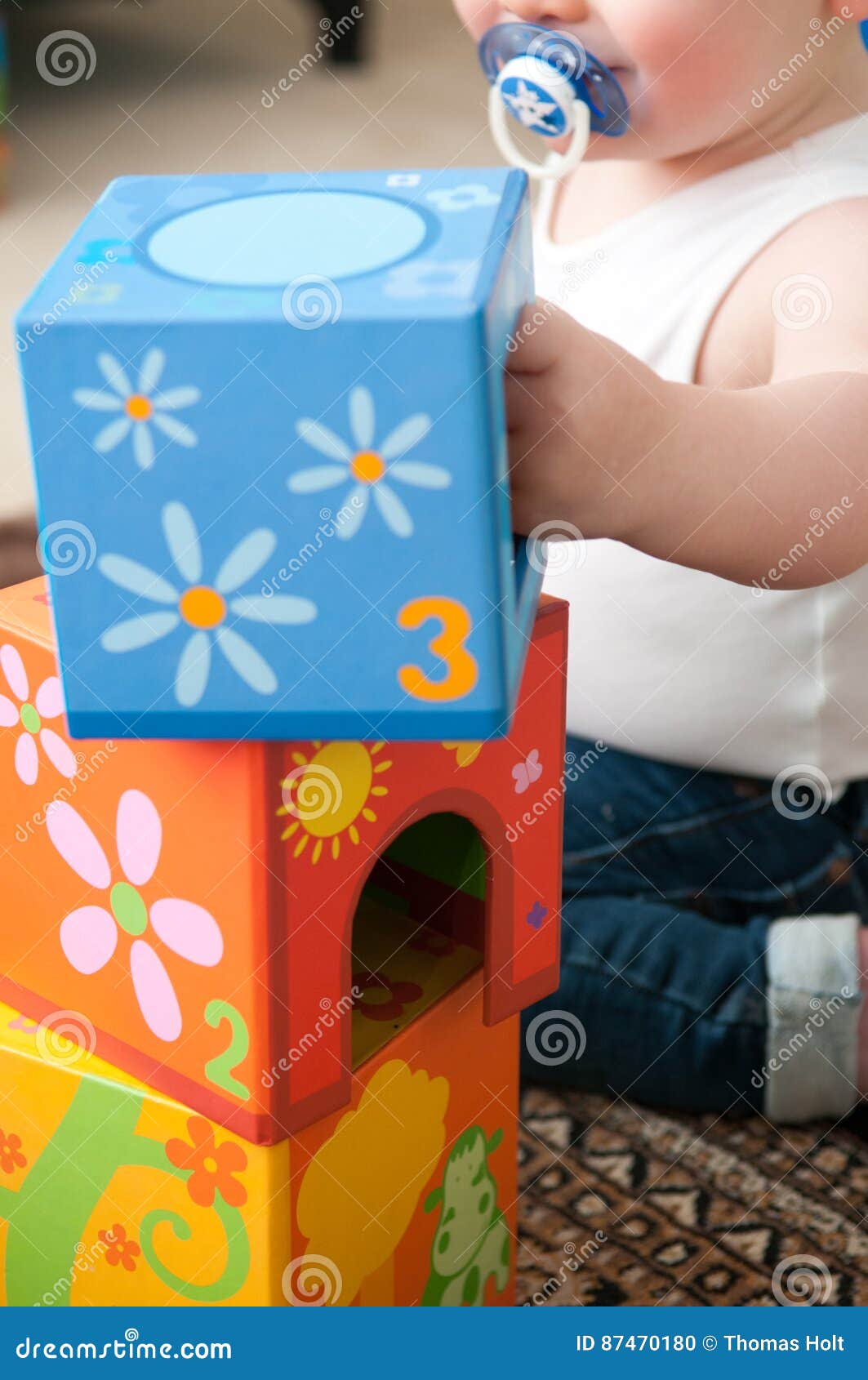 Baby playing with blocks stock photo. Image of child - 87470180