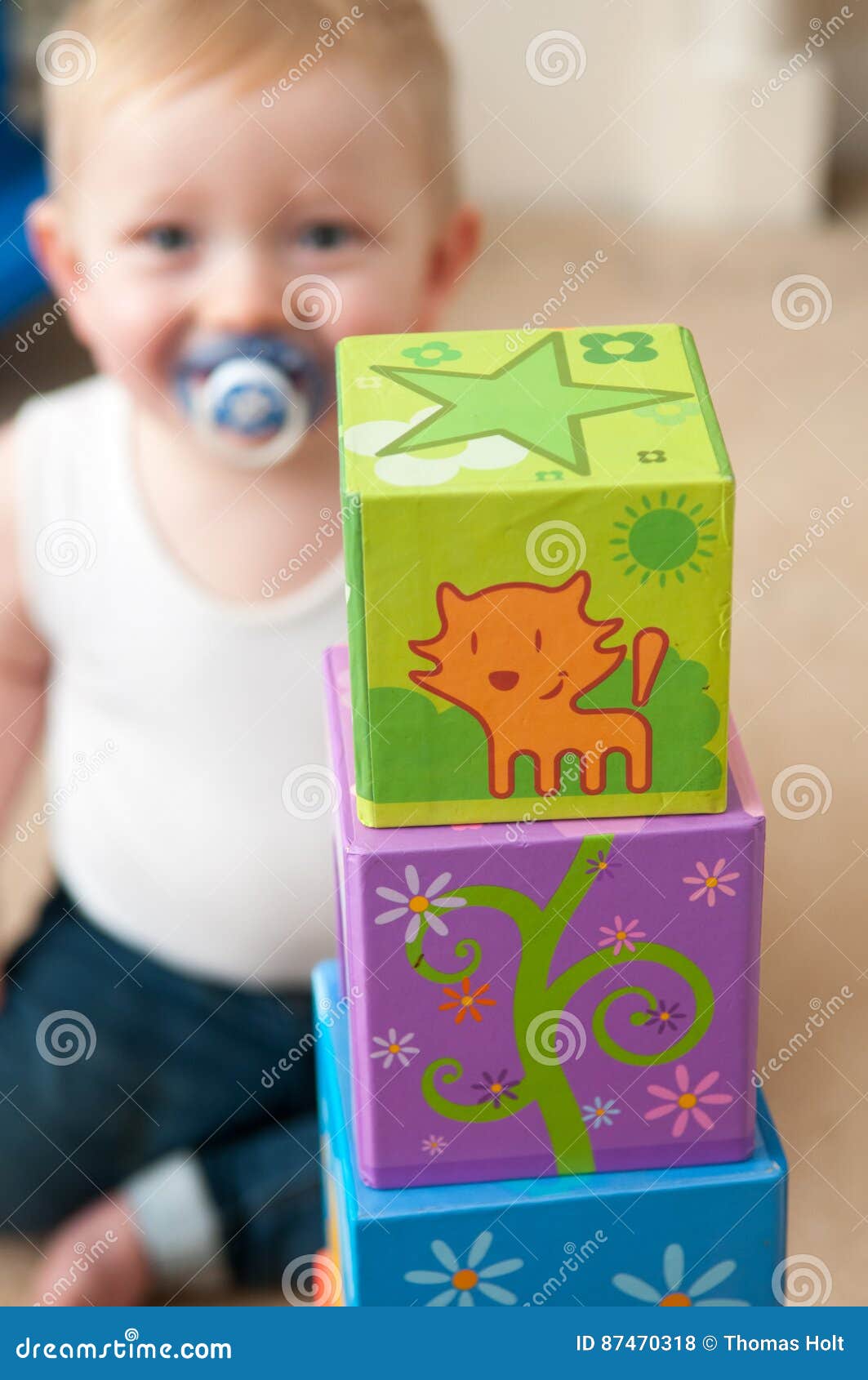 Baby playing with blocks stock photo. Image of educate - 87470318