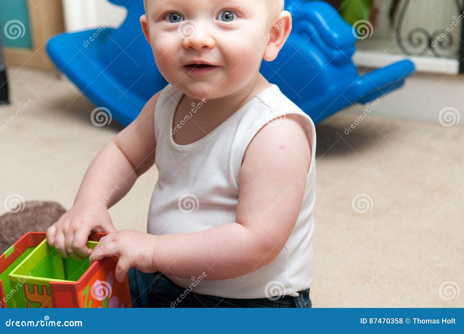 Baby playing with blocks stock photo. Image of educate - 87470358