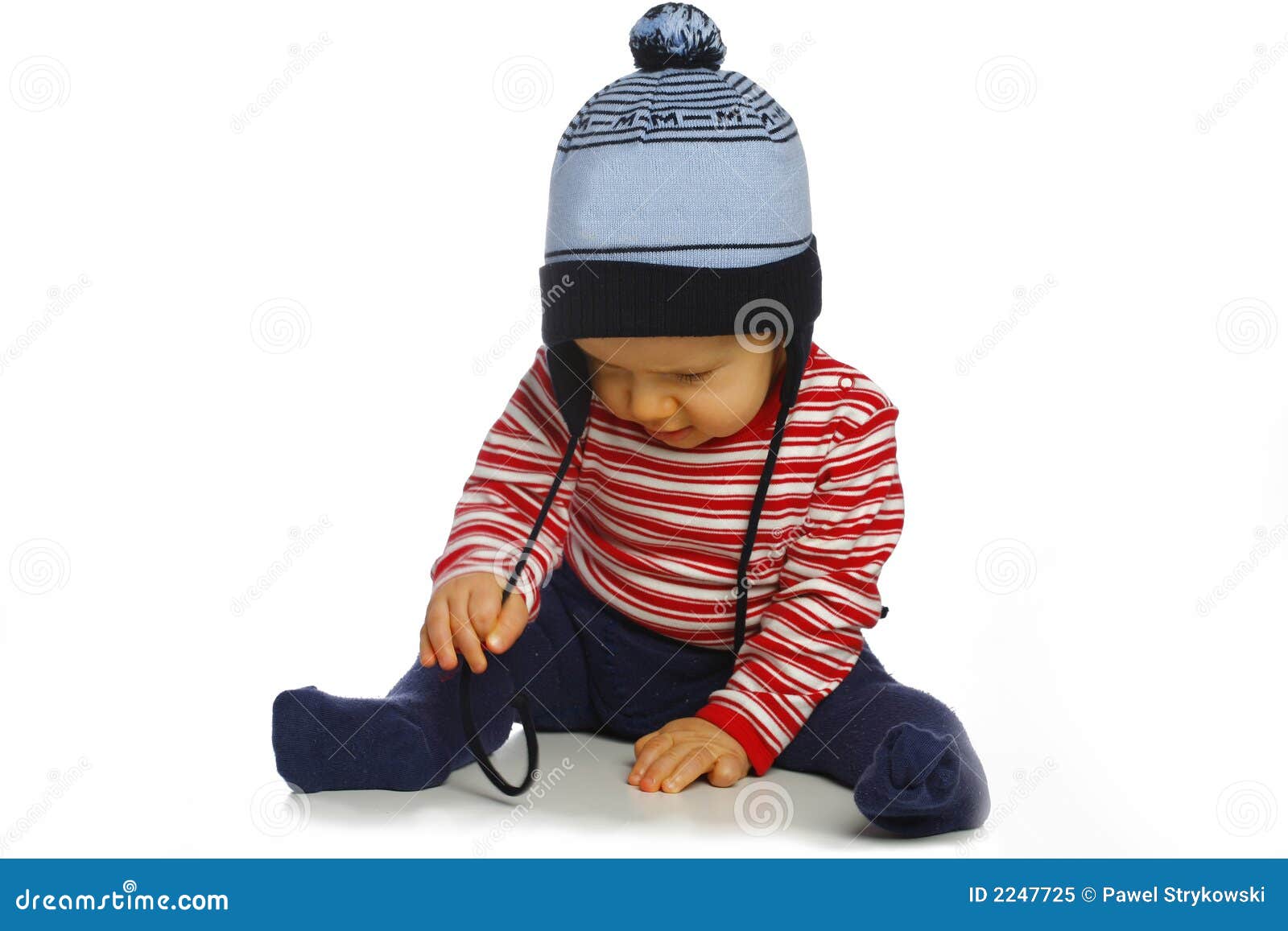 Baby playing a cap stock image. Image of arranged, baby - 2247725