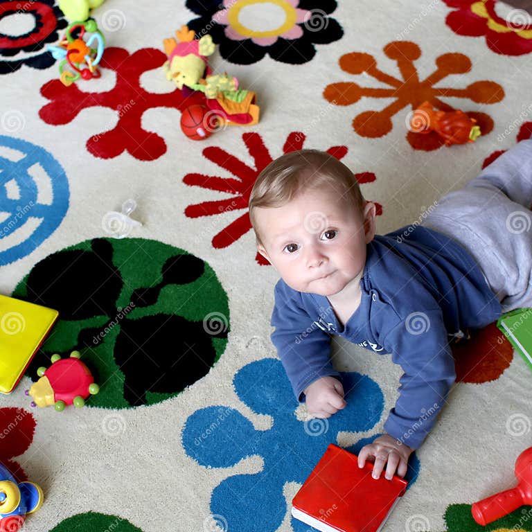 Baby playing on carpet stock image. Image of baby, child - 25062275