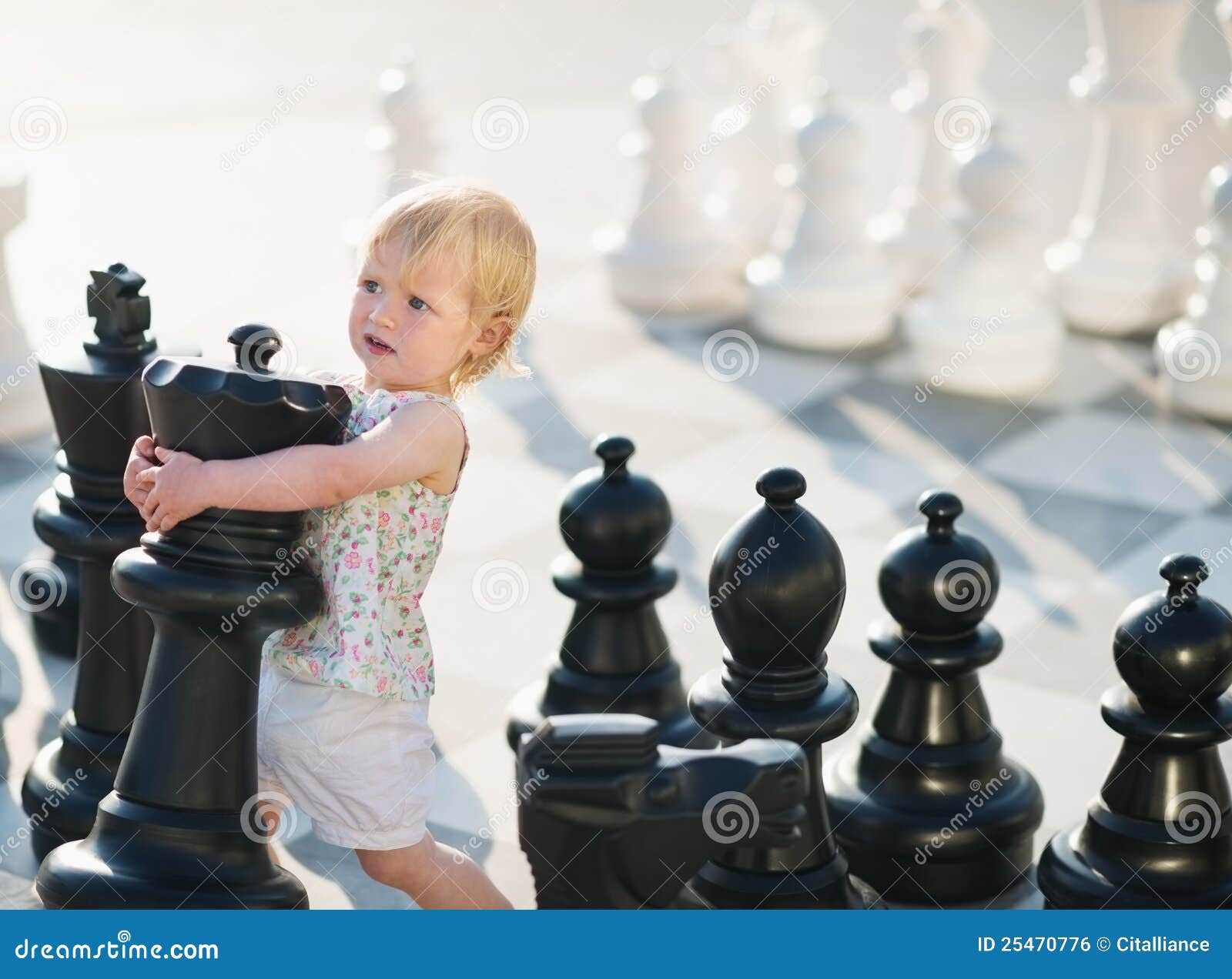 Baby playing in chess stock photo. Image of adorable - 25470776