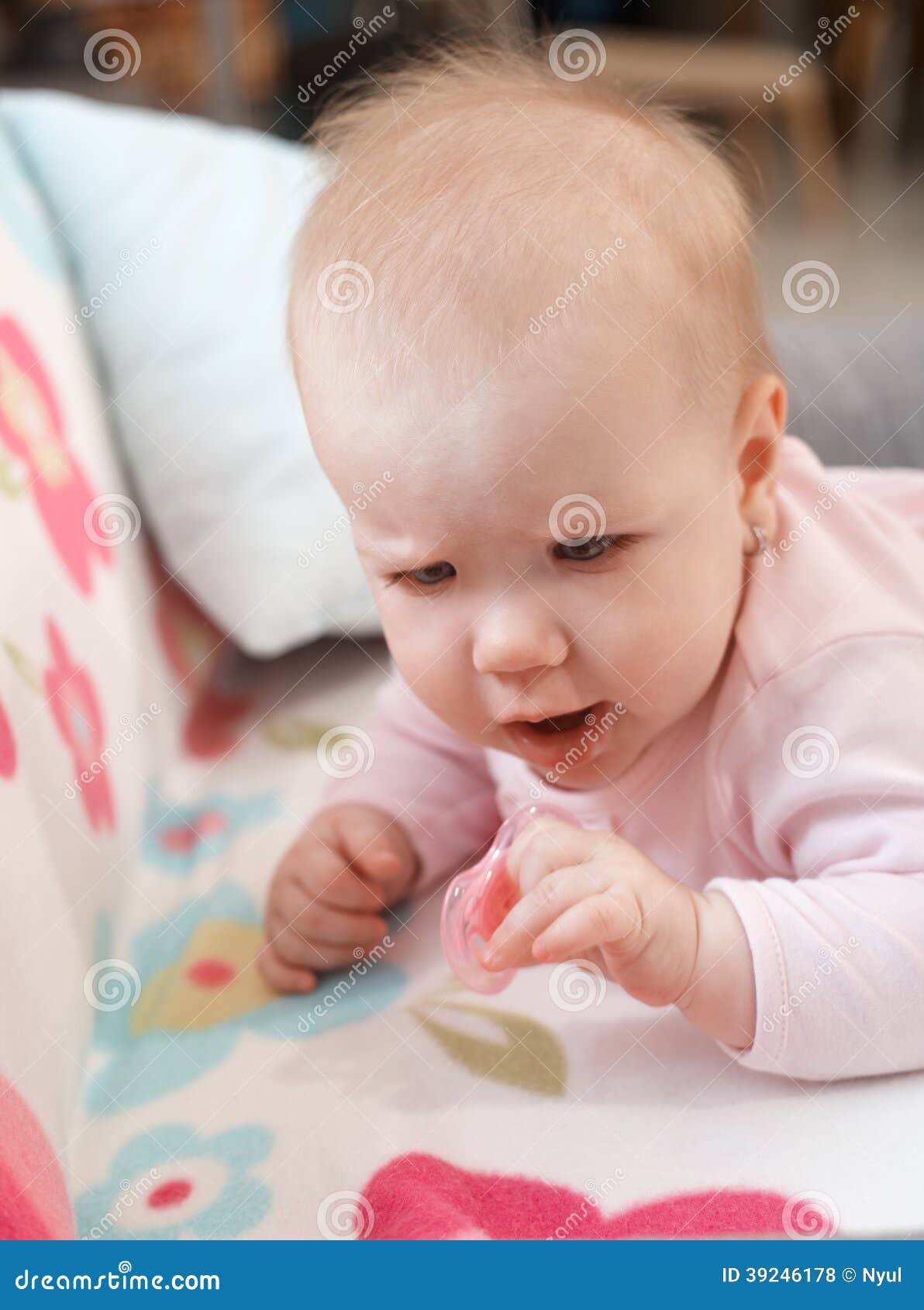 Baby playing with dummy stock photo. Image of indoors - 39246178