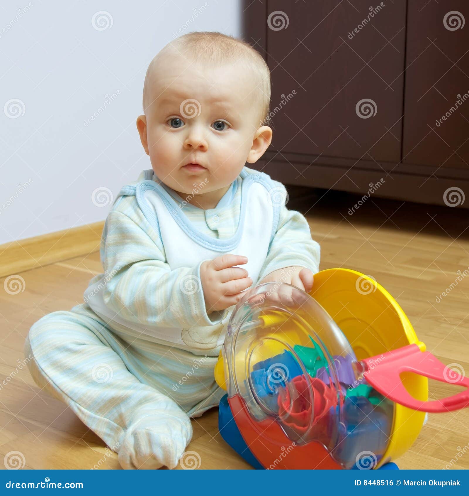 Baby playing on the floor stock photo. Image of healthy - 8448516