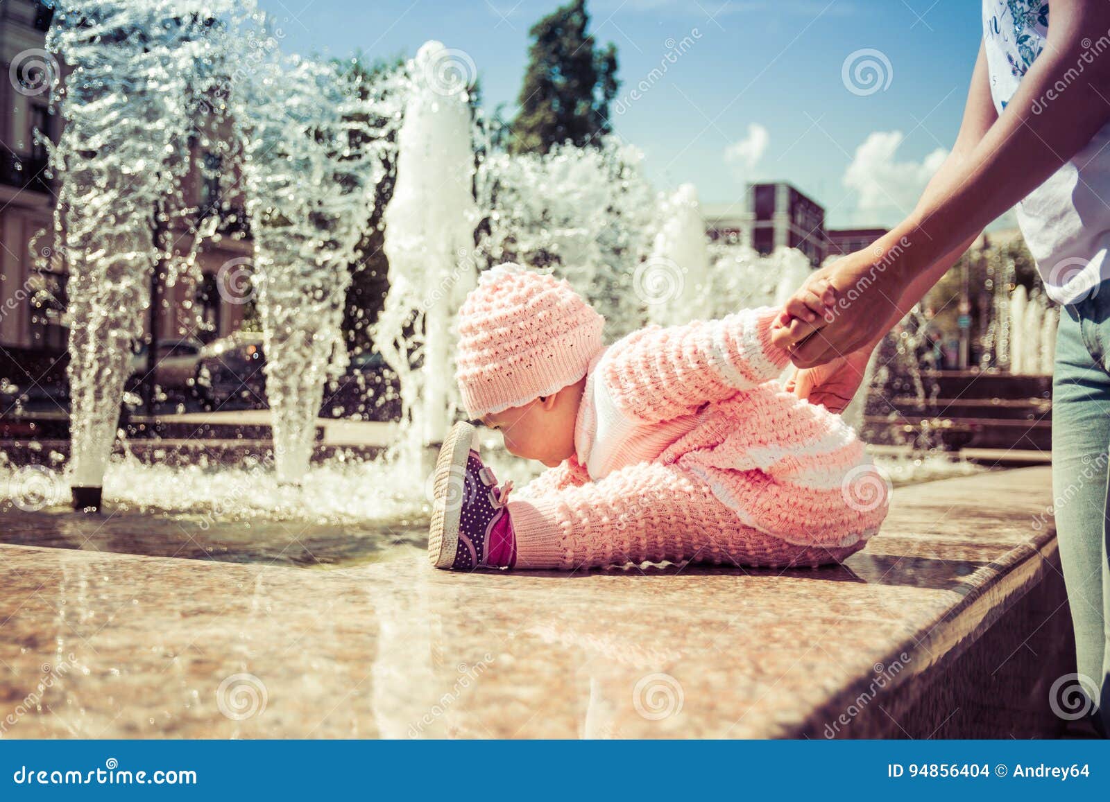 The Baby is Playing at the Fountain Stock Photo - Image of drops ...