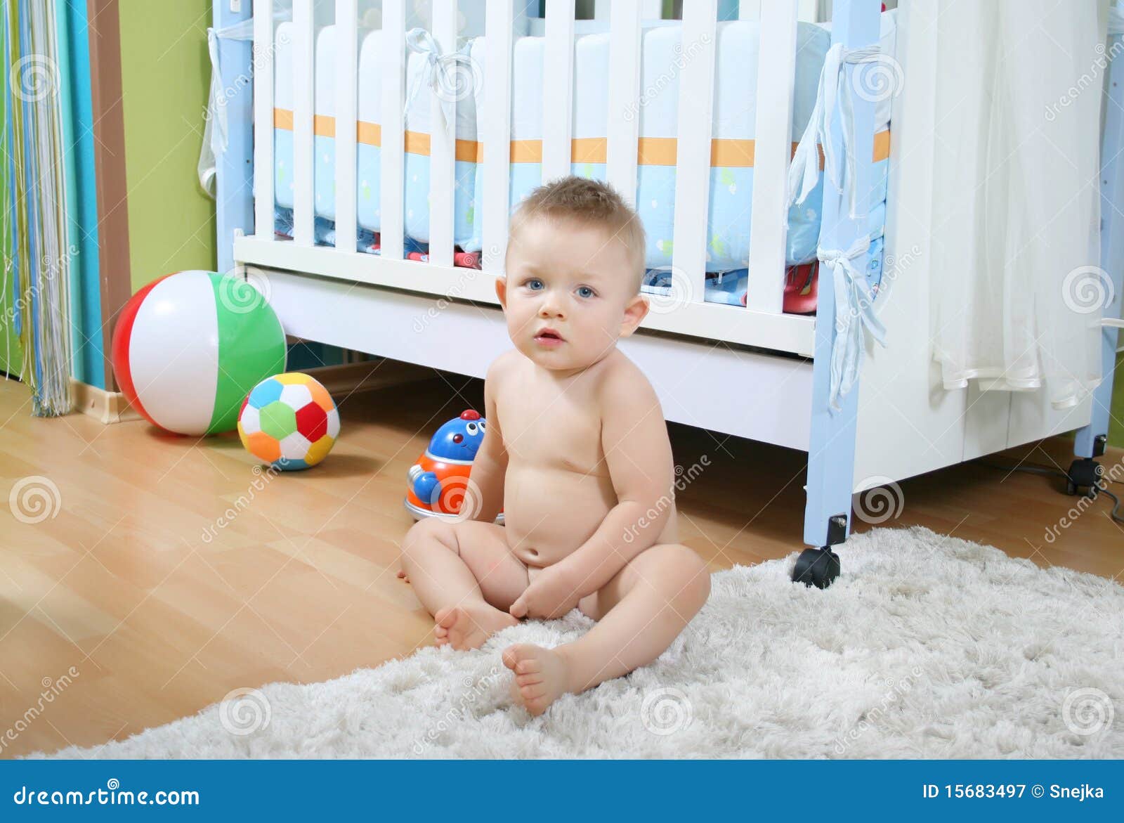 Baby playing at home stock image. Image of ball, bedroom - 15683497