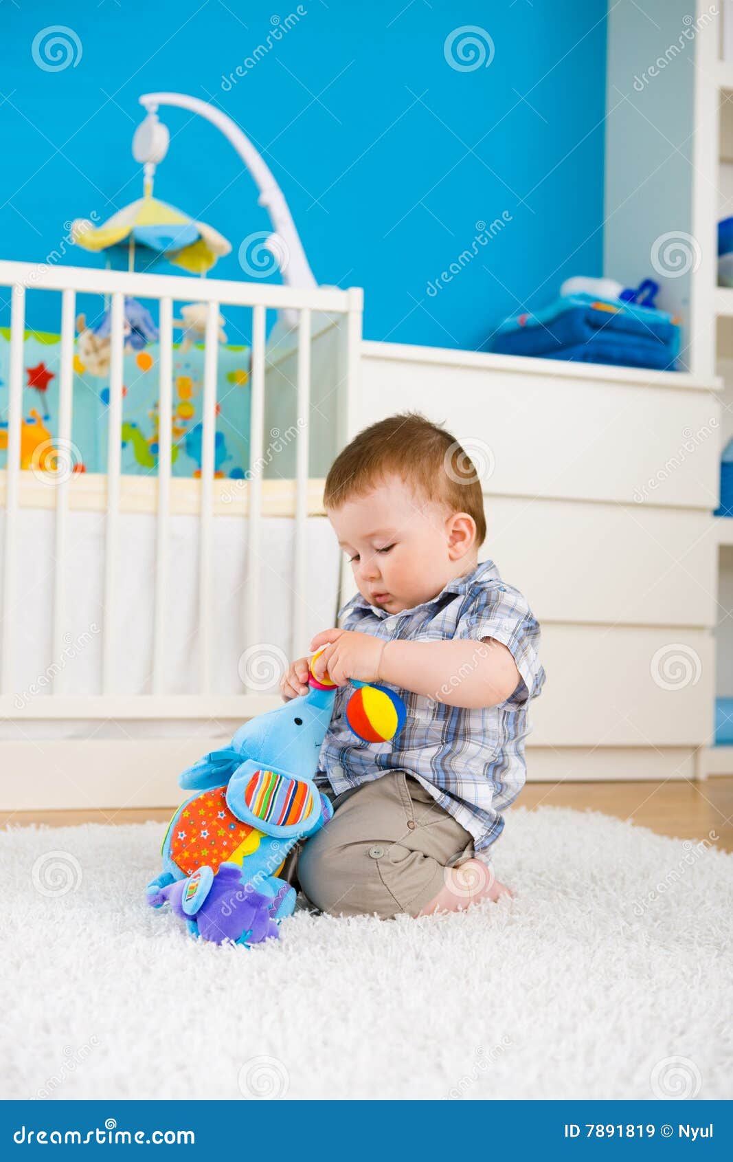Baby playing at home stock image. Image of family, concentration - 7891819
