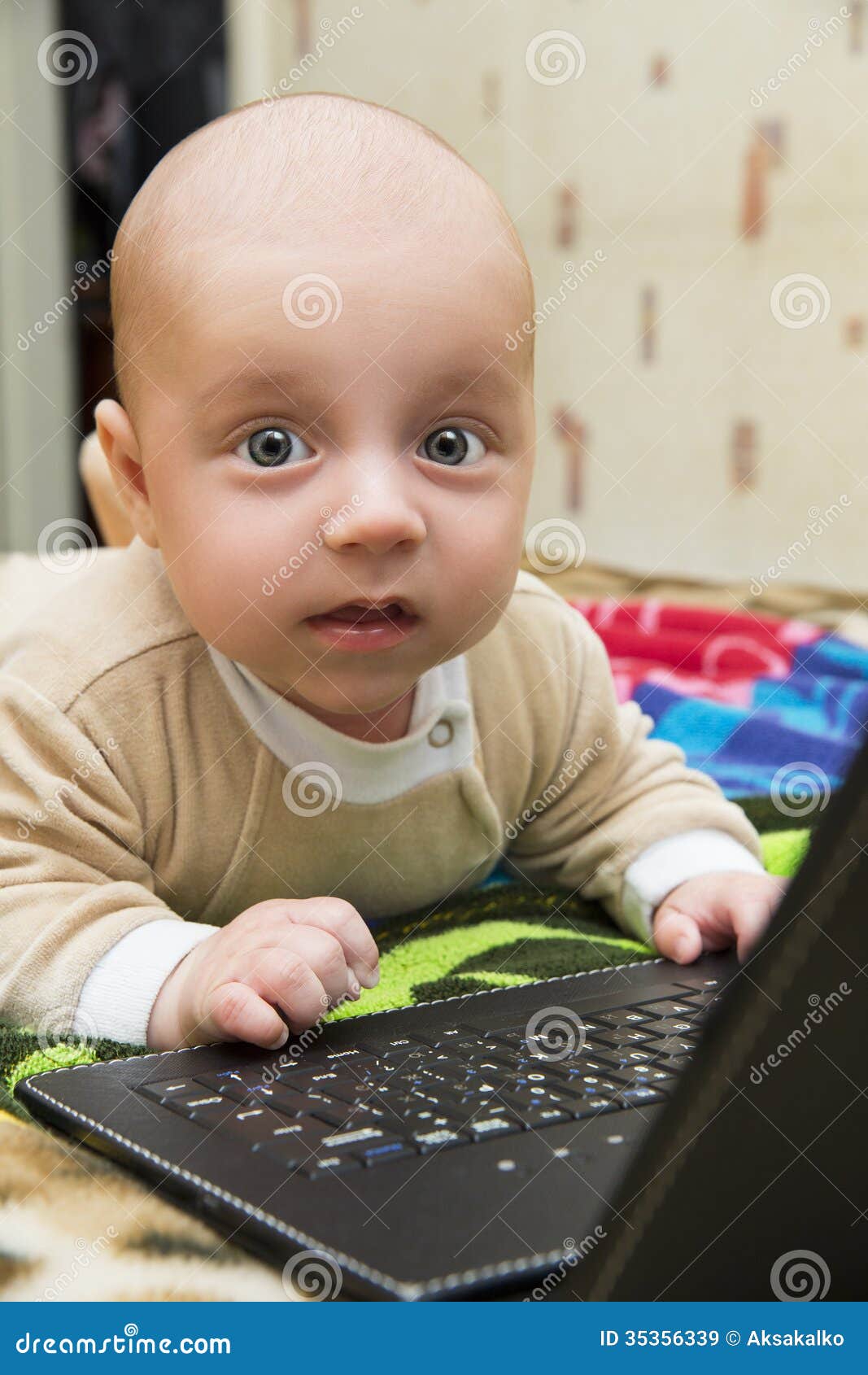 Baby Playing with the Laptop. Stock Image - Image of cute, face: 35356339