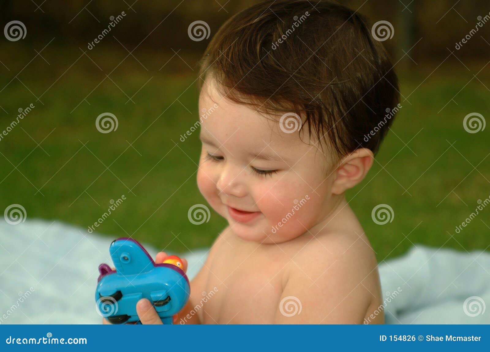 Baby Playing Outside stock photo. Image of youngster, holding - 154826