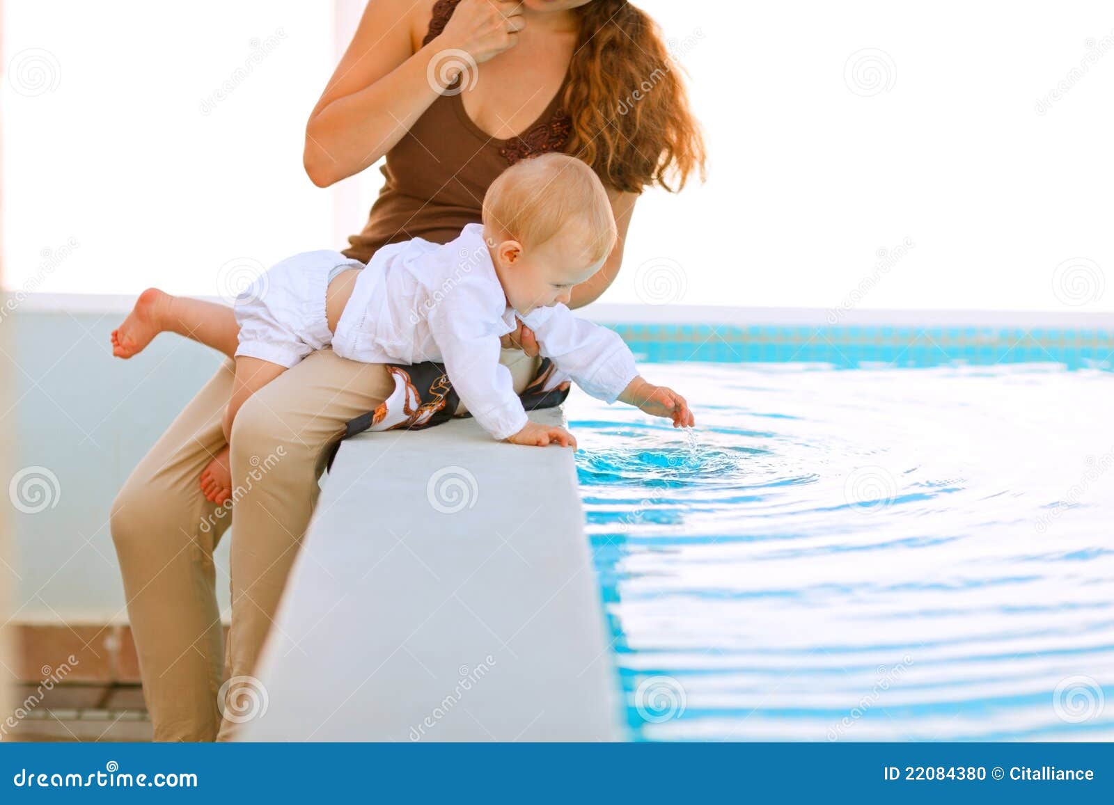 Baby Playing with Pool Water Stock Photo - Image of mommy, gleeful ...