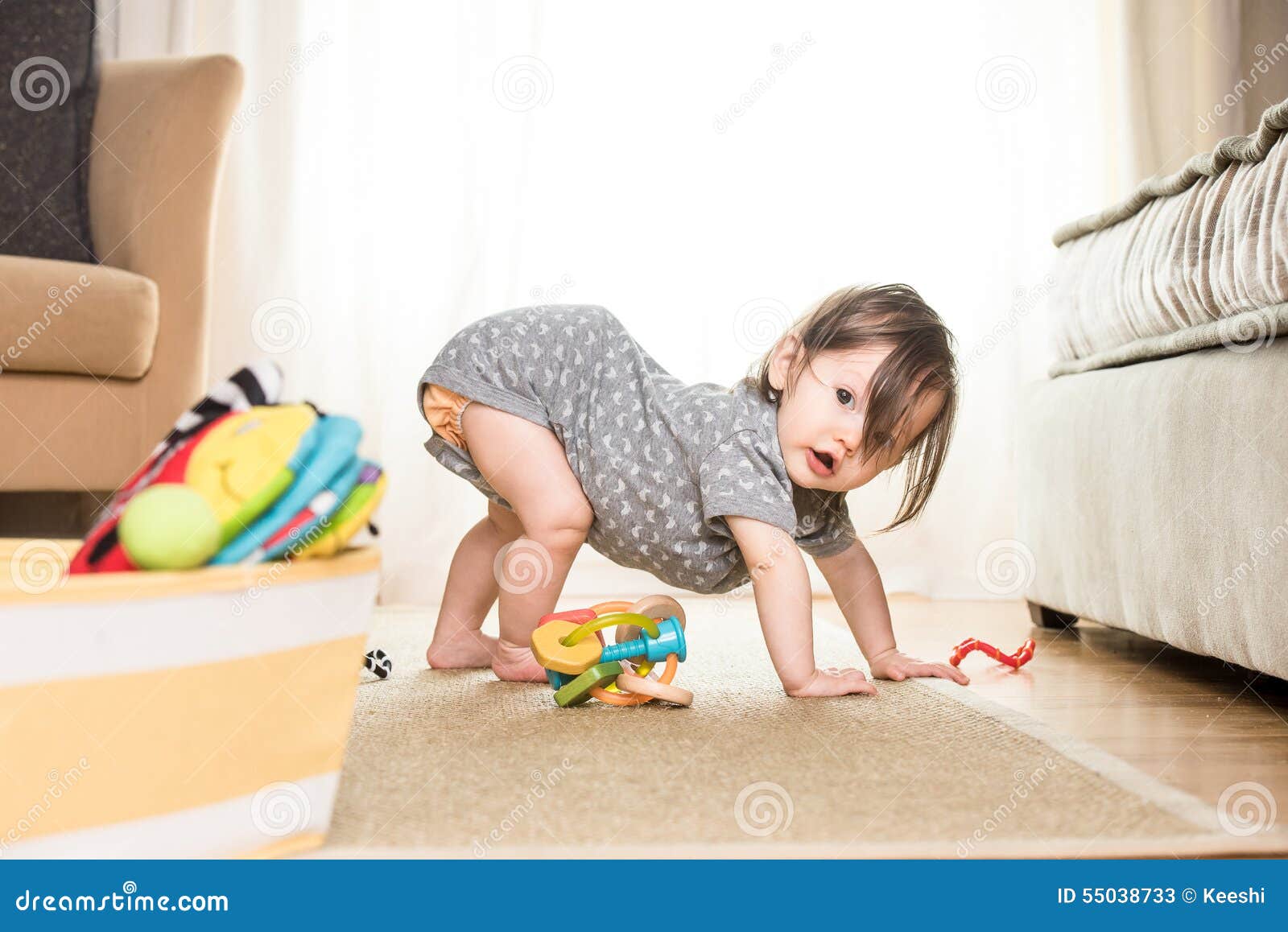 Baby Playing on Rug stock image. Image of toys, playing - 55038733