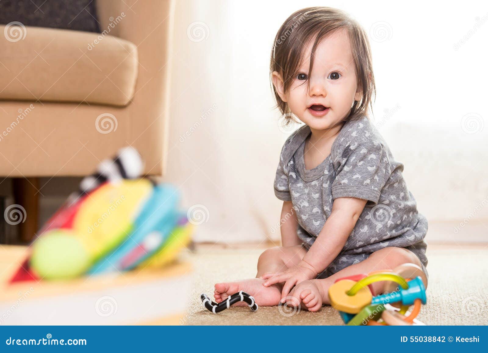 Baby Playing on Rug stock photo. Image of playing, product - 55038842
