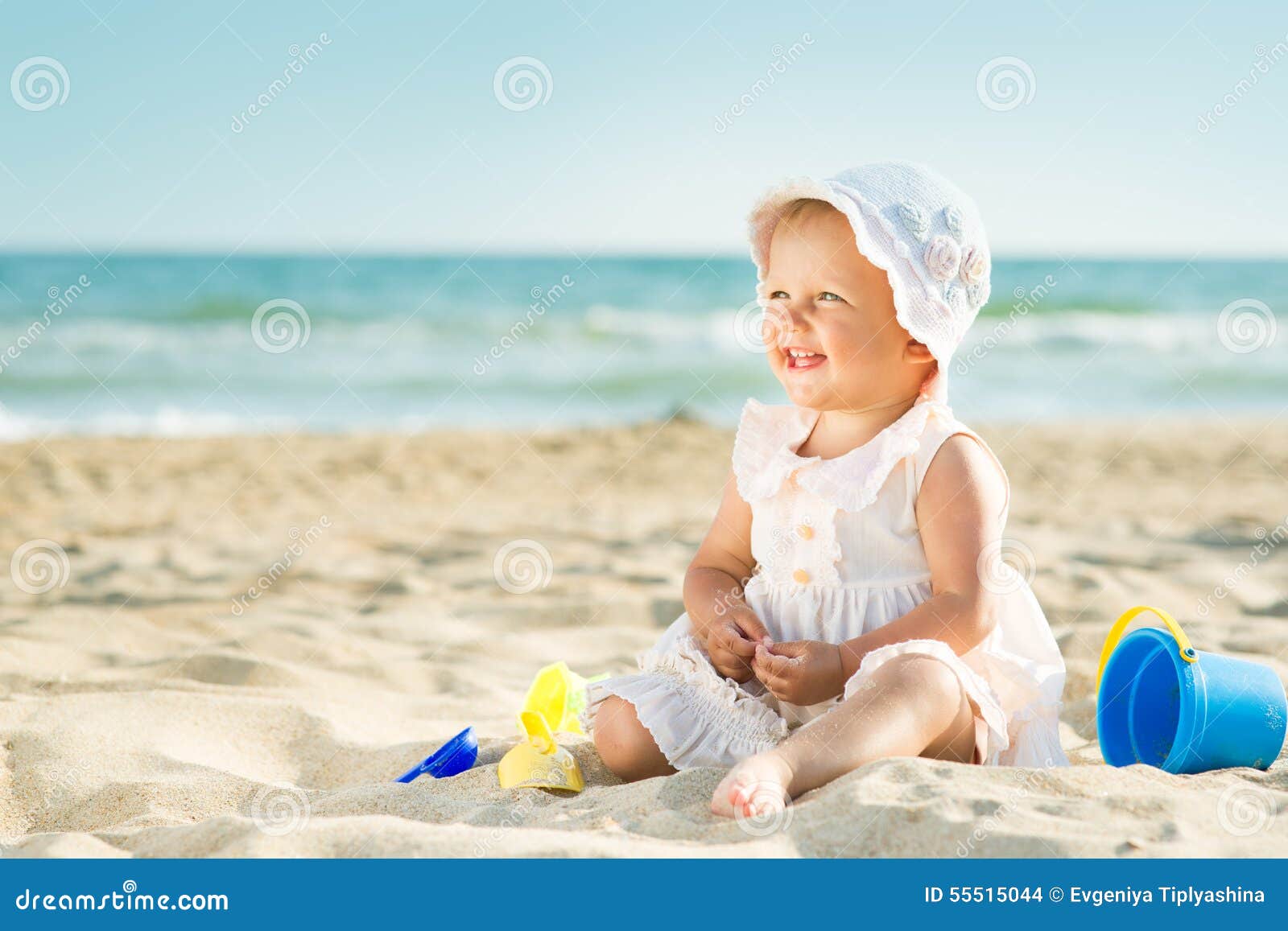 Baby playing at the sea stock photo. Image of relaxation - 55515044