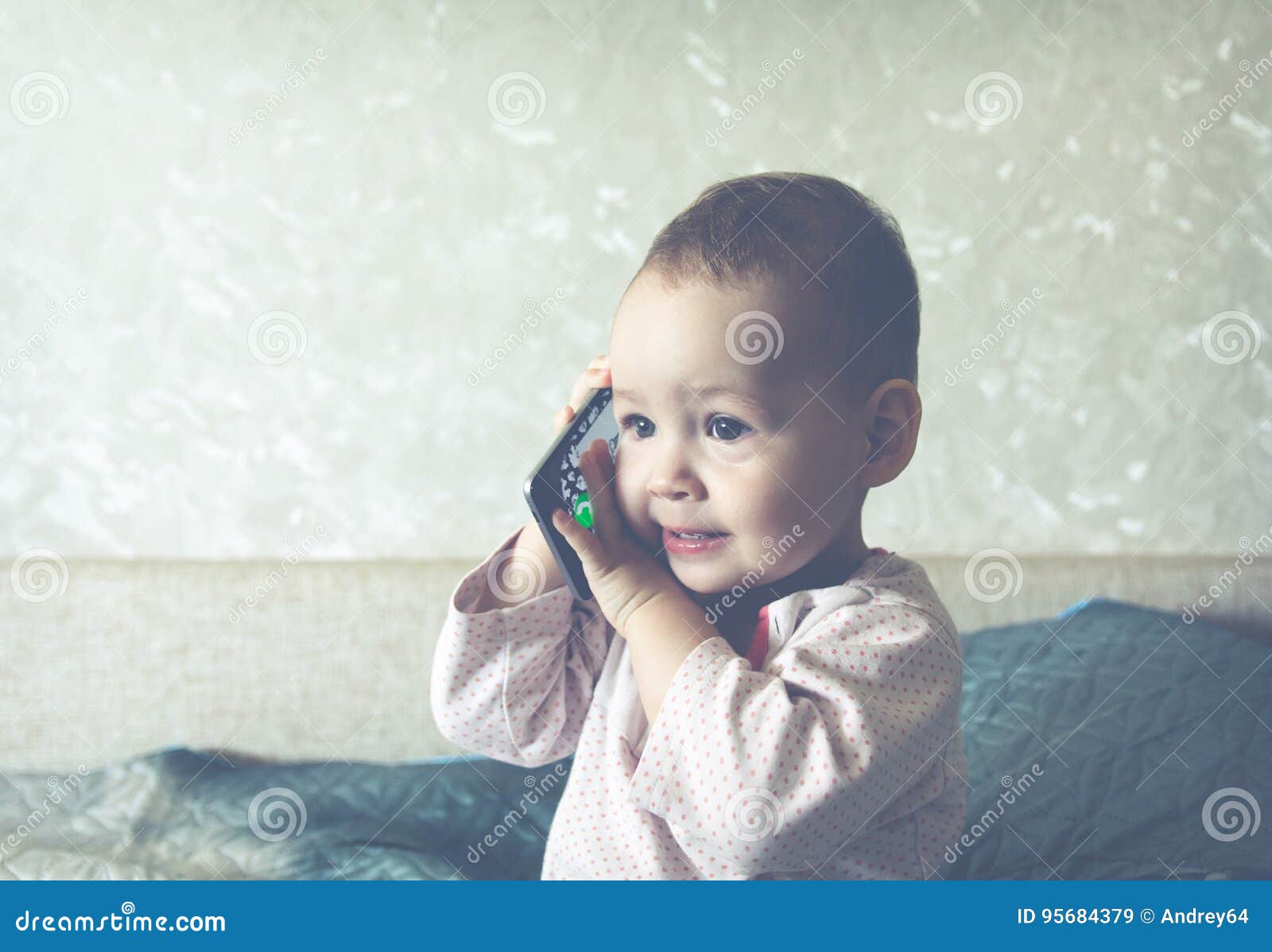 The Baby is Playing with a Smartphone Stock Image - Image of adorable ...