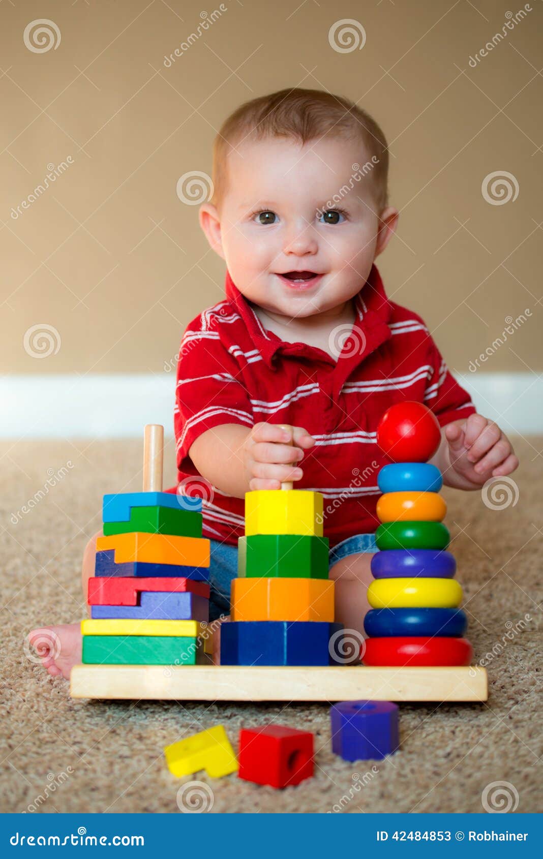 Baby Playing with Stacking Learning Toy Stock Image - Image of ...