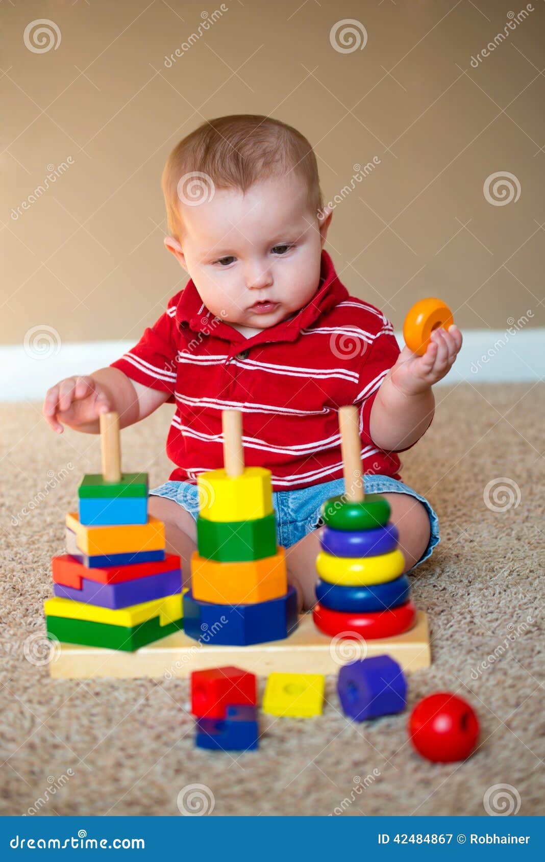Baby Playing with Stacking Learning Toy Stock Image - Image of home ...