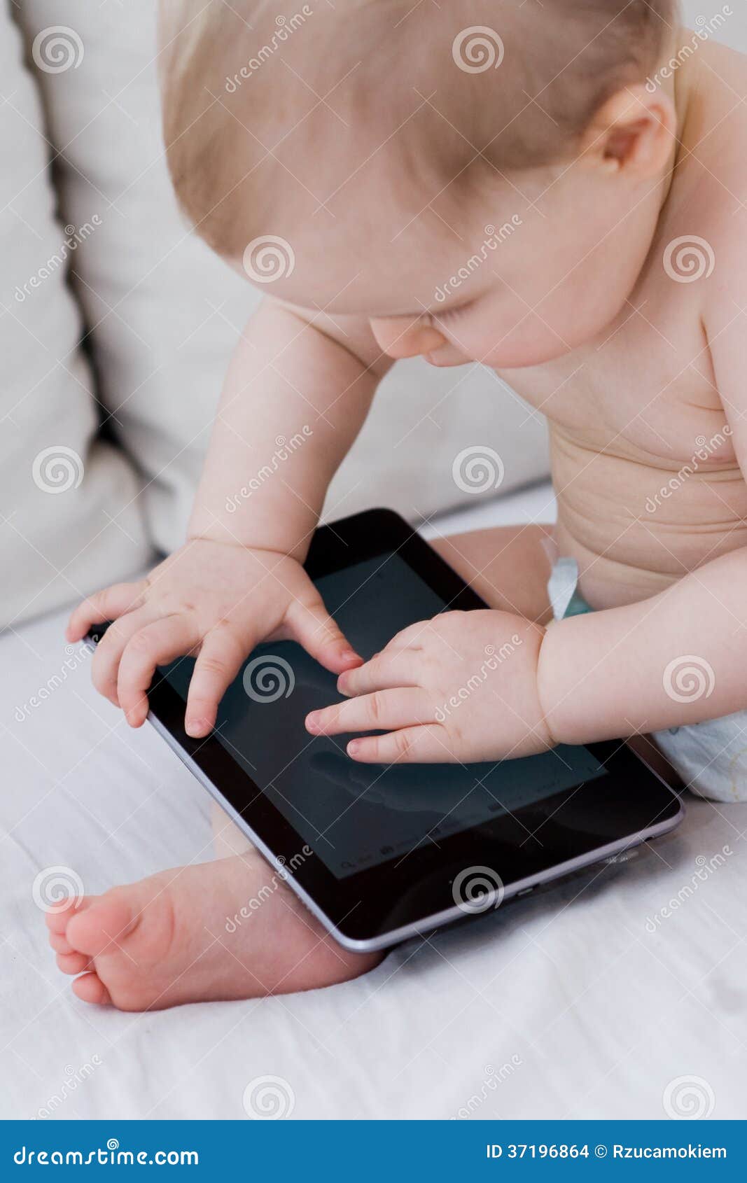 Baby playing with tablet stock photo. Image of family - 37196864