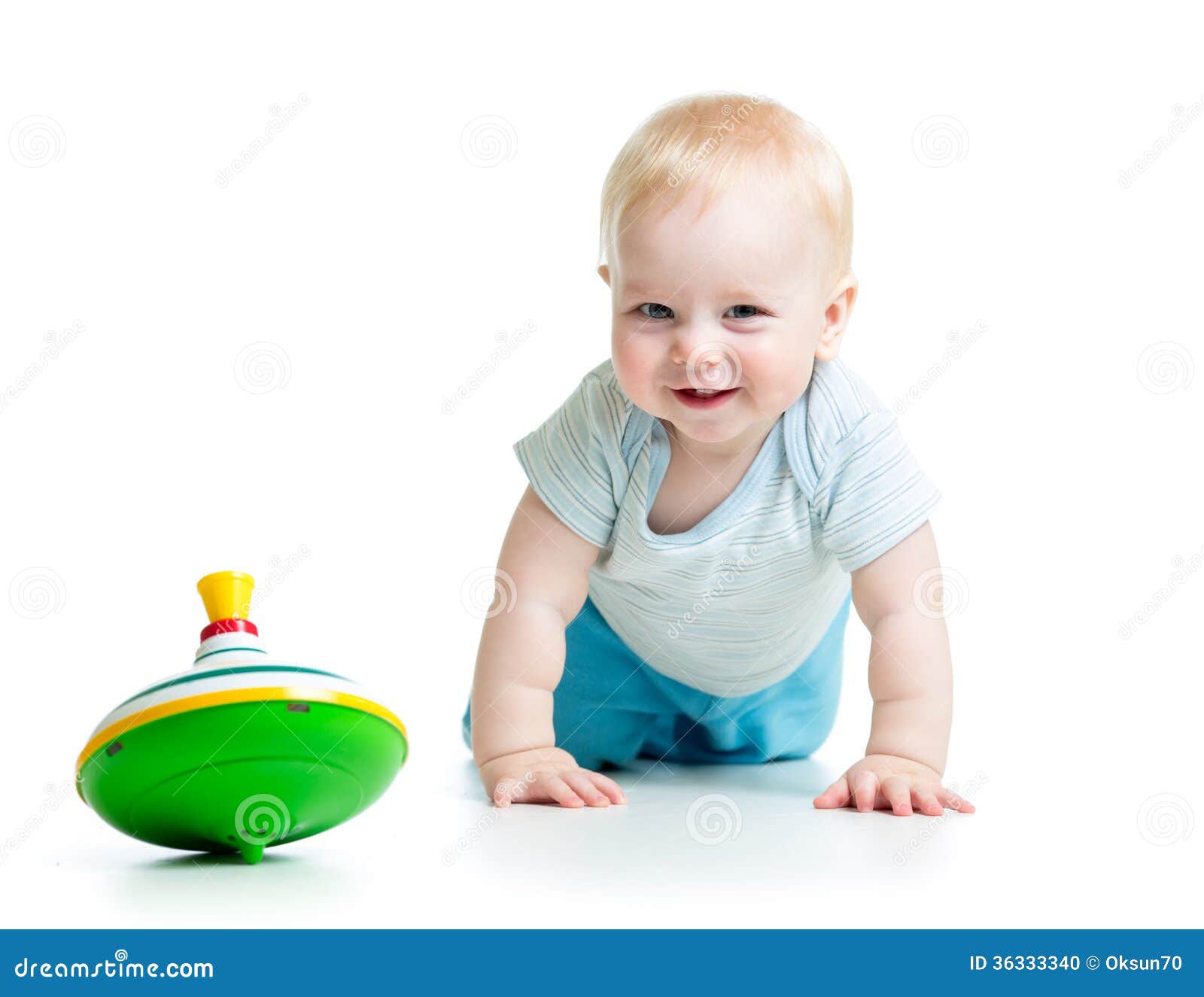 Baby Playing with Toy Whirligig Stock Photo - Image of concentrated ...