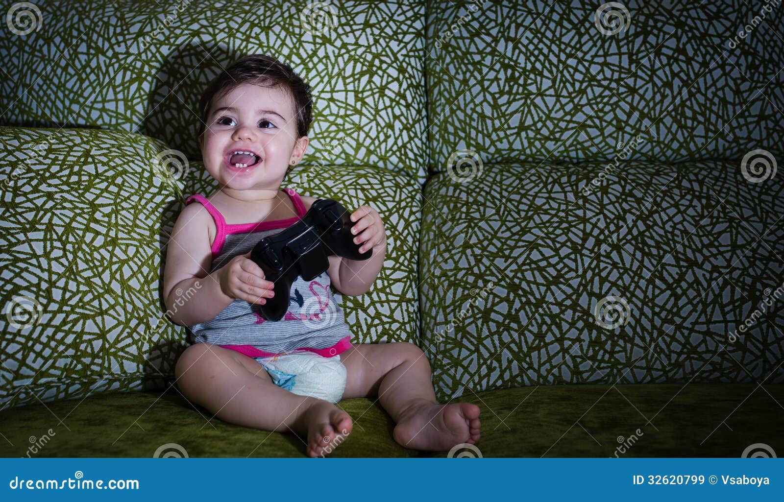 Baby playing video games stock image. Image of joystick - 32620799