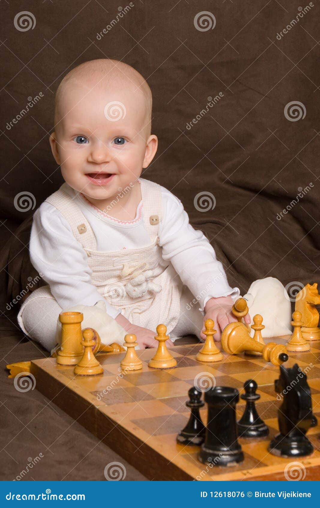 Baby plays chess stock photo. Image of face, genius, background - 12618076