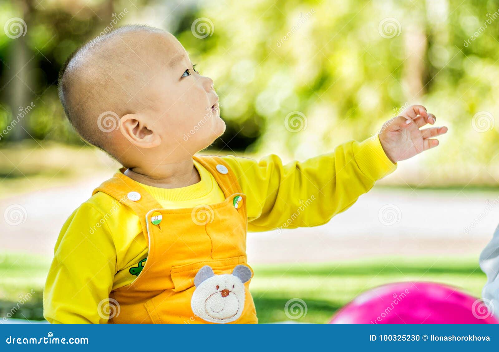 A Baby Plays On The Mat In The Park Stock Photo - Image of childhood ...