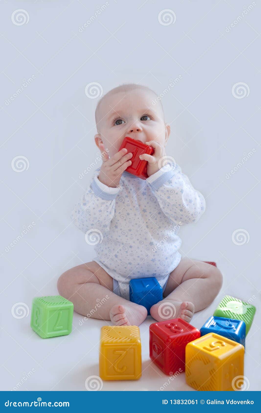 The Baby Plays with the Multi-coloured Cubes Stock Image - Image of ...