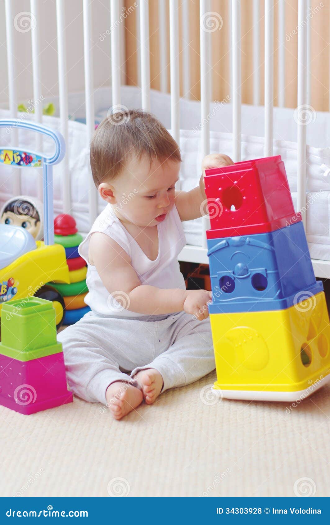 Baby Plays Nesting Blocks at Home Stock Photo - Image of plays ...