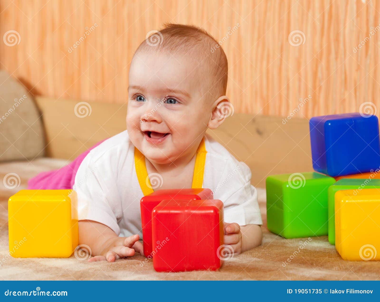 Baby plays with toy blocks stock image. Image of indoor - 19051735