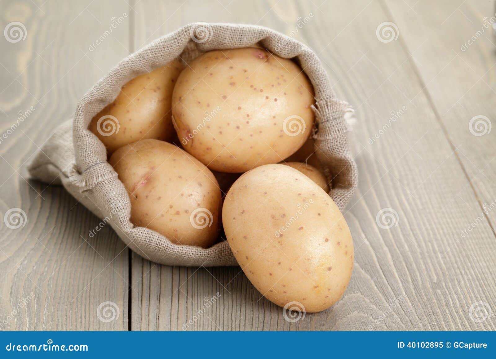 Baby potatoes in sack bag stock image. Image of uncooked - 40102895
