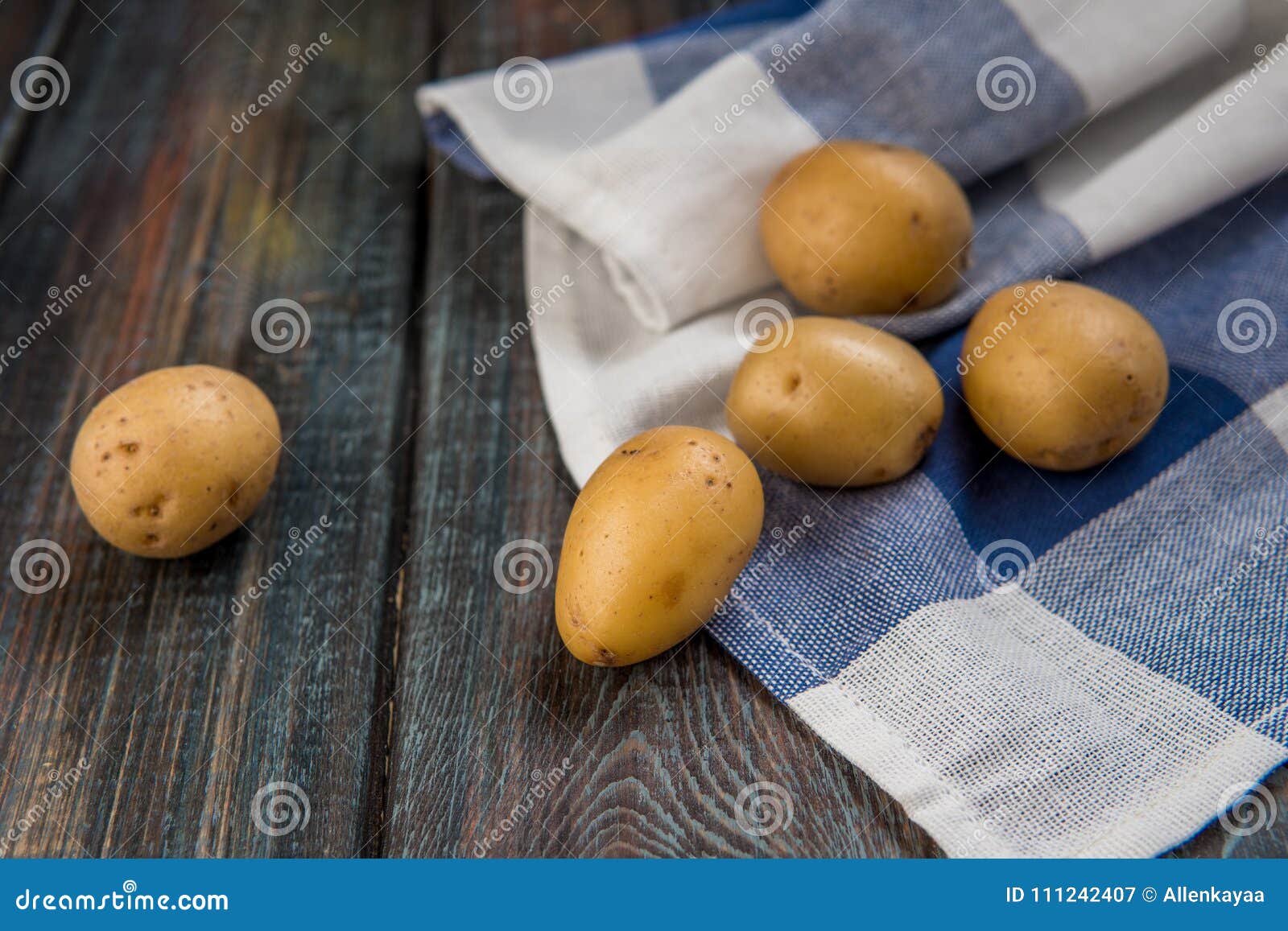 Baby Potatoes on a Table. Raw Potatoes Stock Image - Image of board ...